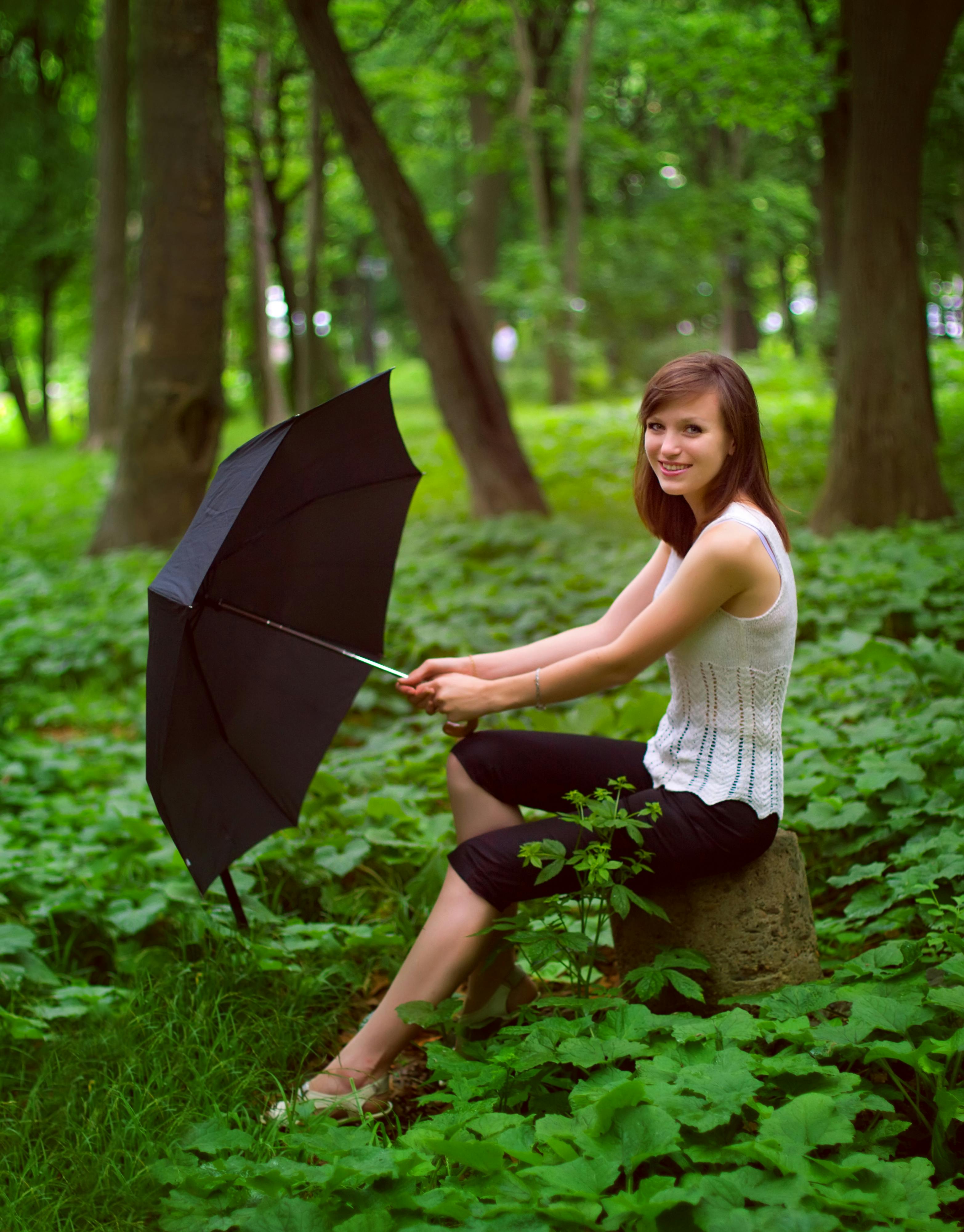 A Woman Standing Beside the Tree · Free Stock Photo