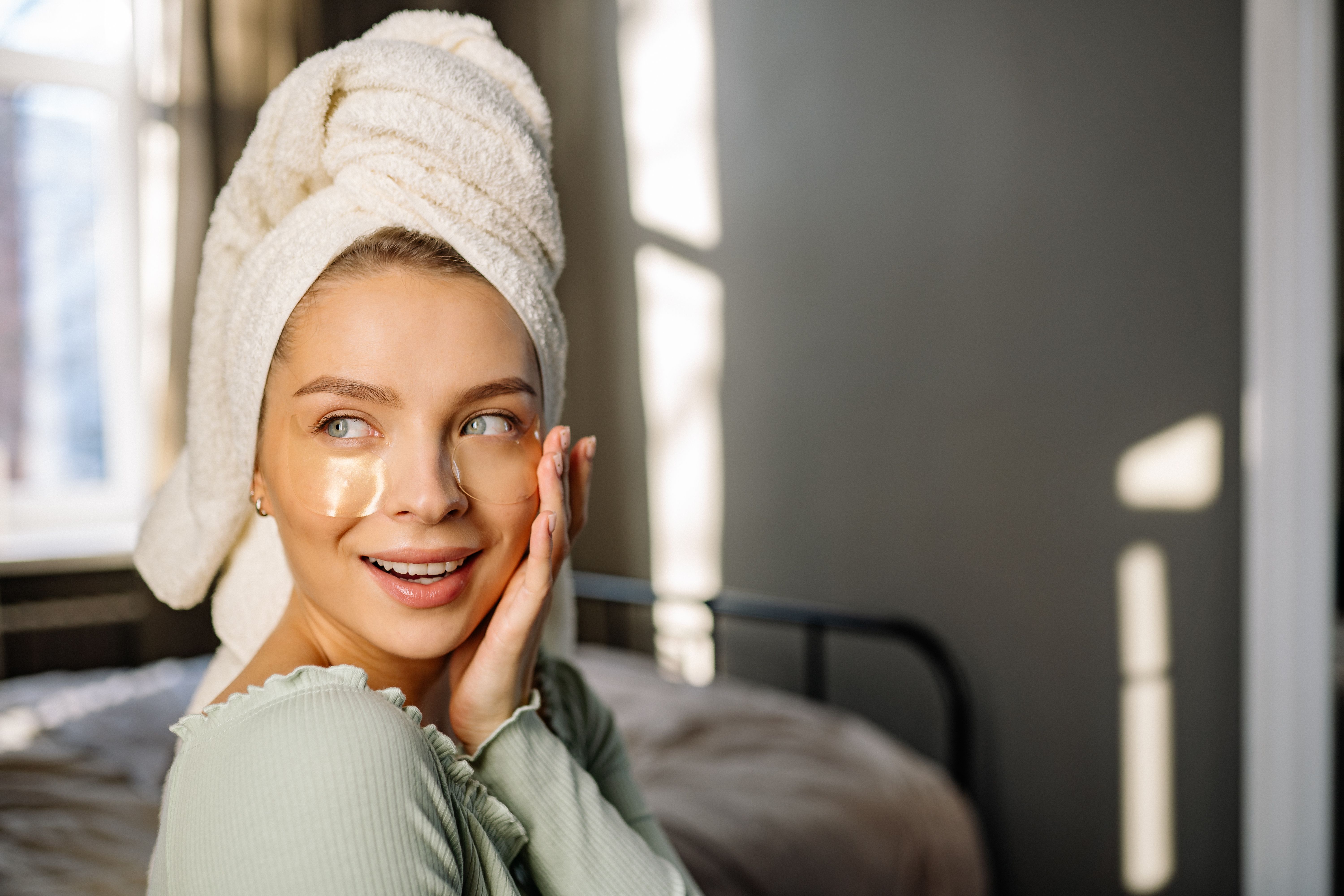 A Woman Using a Skin Care Product · Free Stock Photo