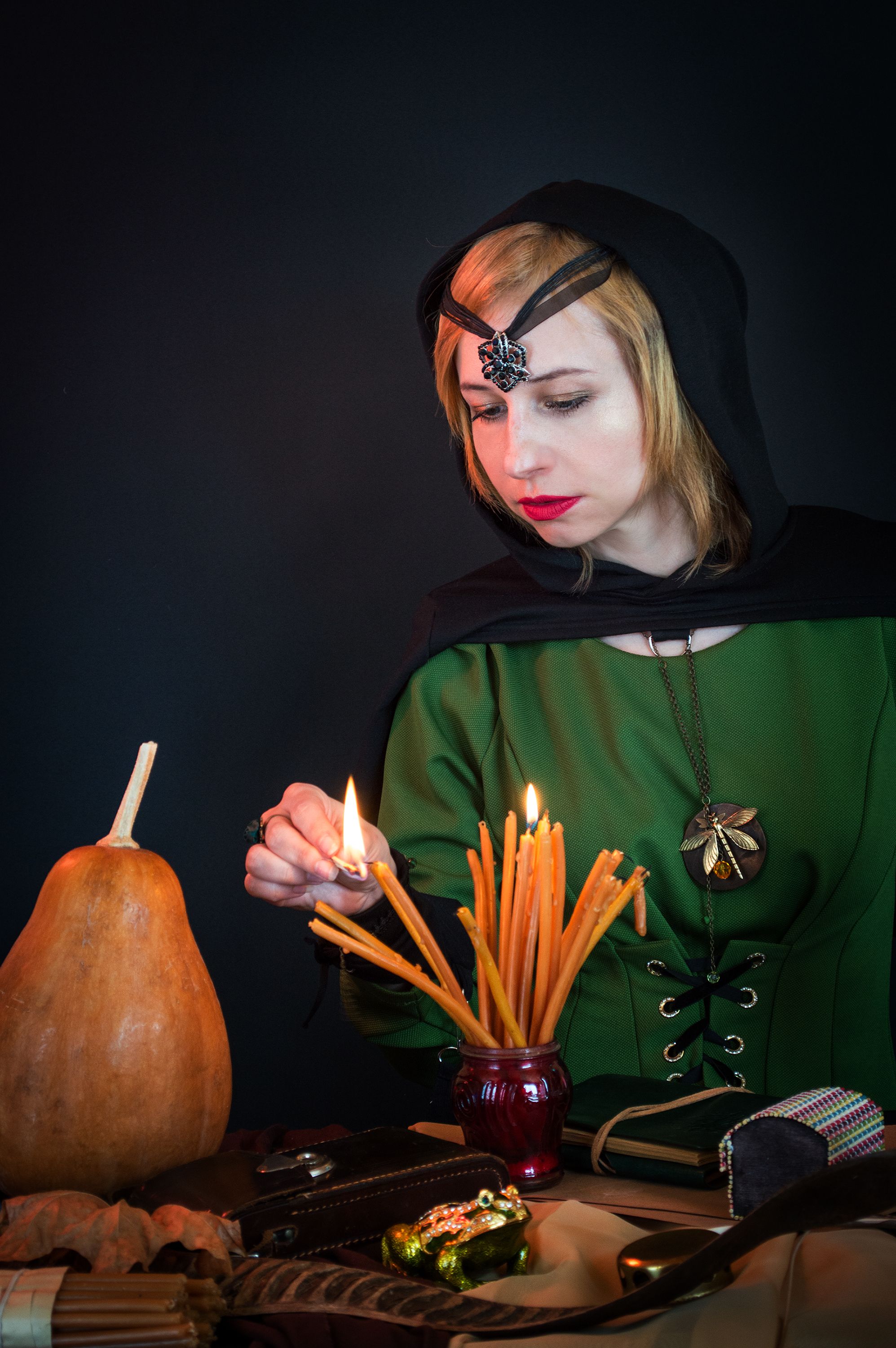 Faceless tattooed soothsayer with burning candles at home · Free Stock ...