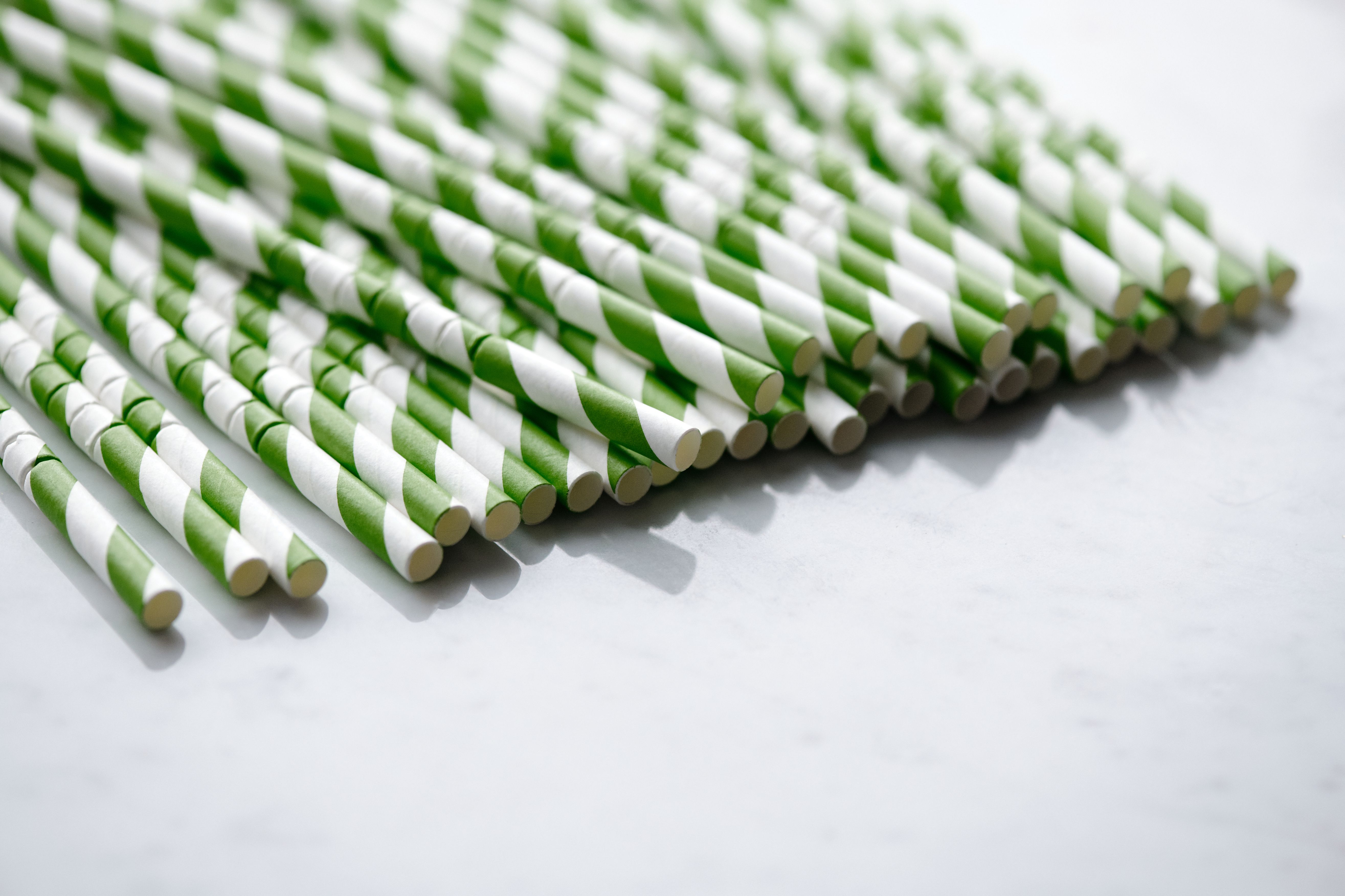 Close-up Photo of Green and White Straws · Free Stock Photo