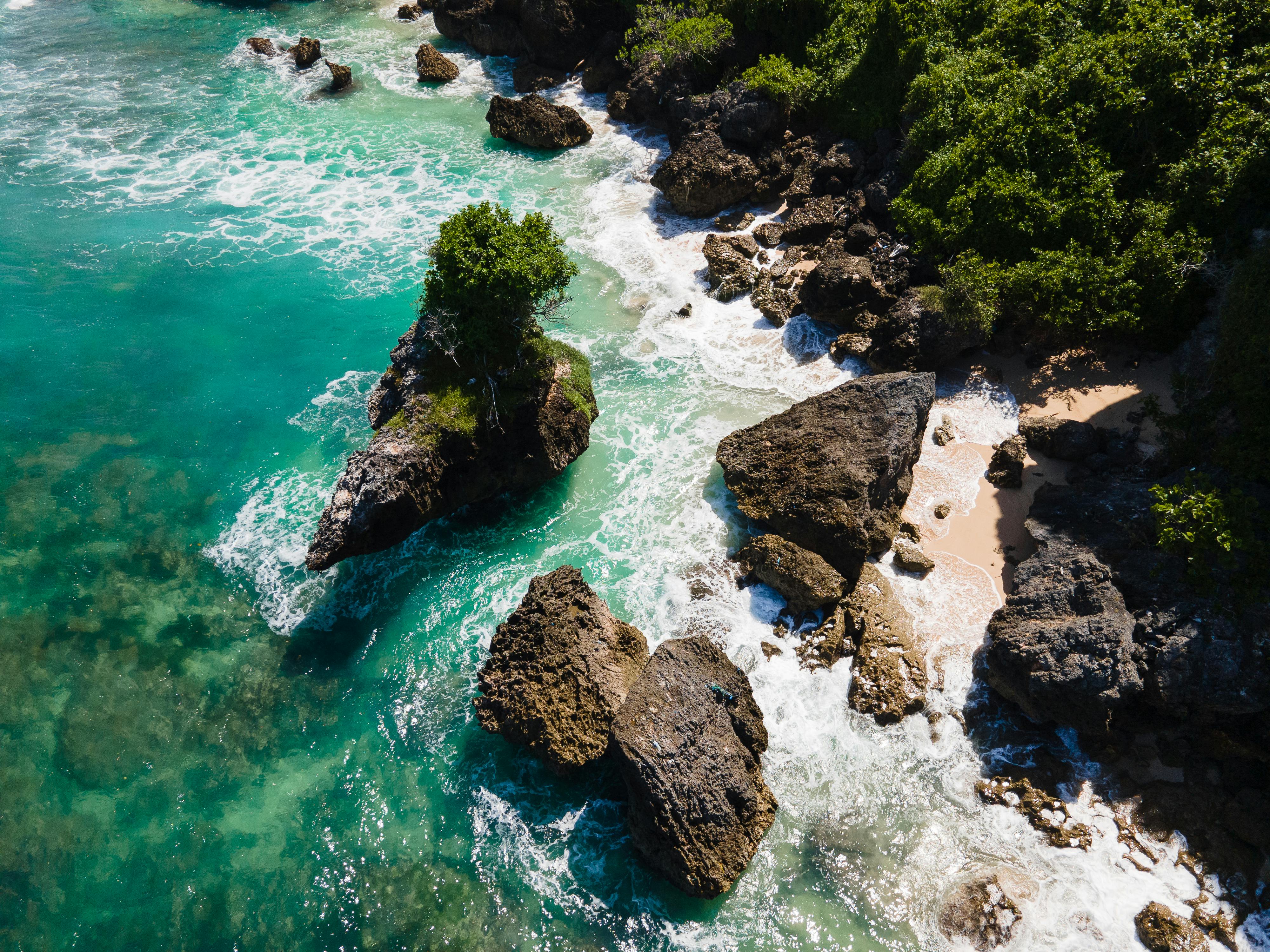 Aerials Shot of Natural Rock Formations on the Beach · Free Stock Photo