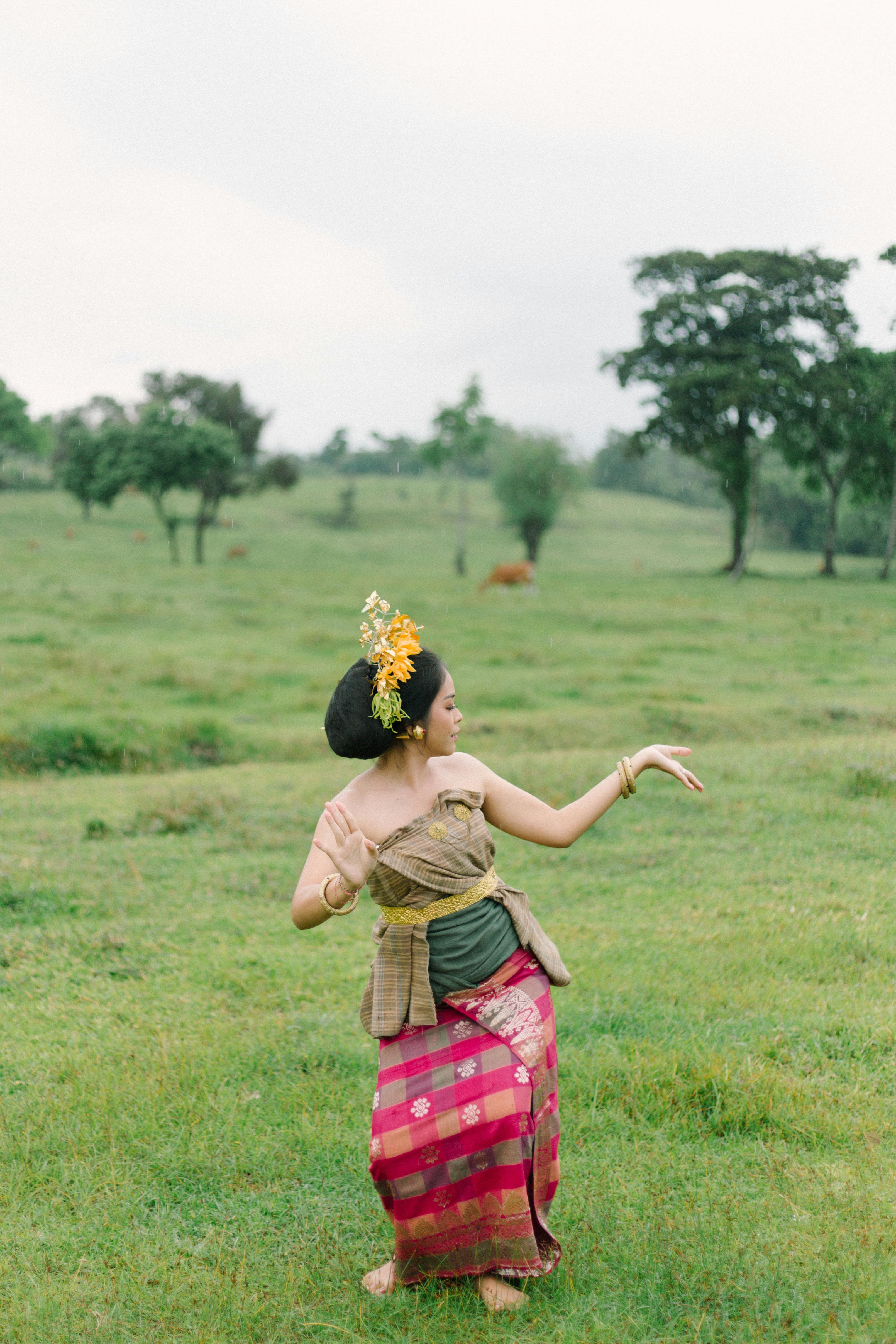 Photo of a Woman Doing a Traditional Dance · Free Stock Photo