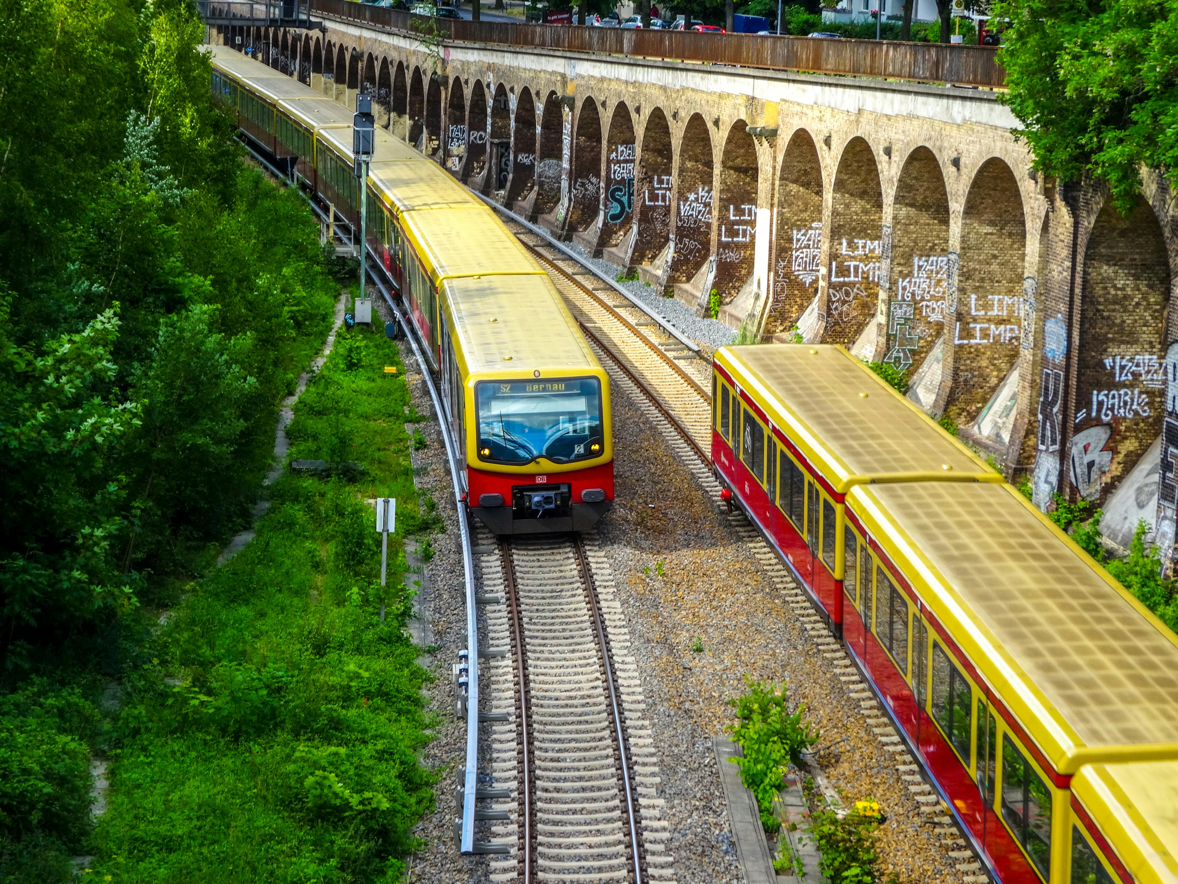 Yellow Trains on the Railways · Free Stock Photo