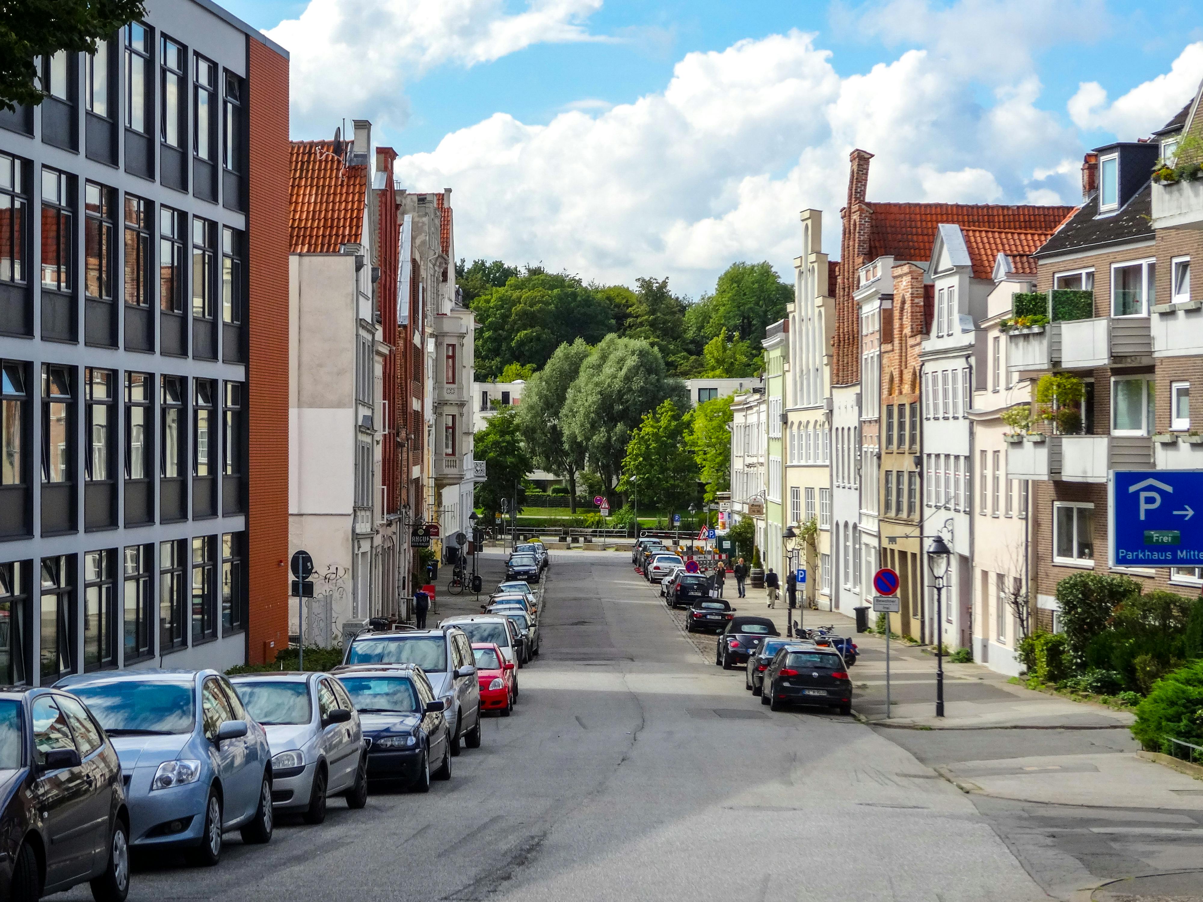Photo of Cars Parked Near Buildings · Free Stock Photo