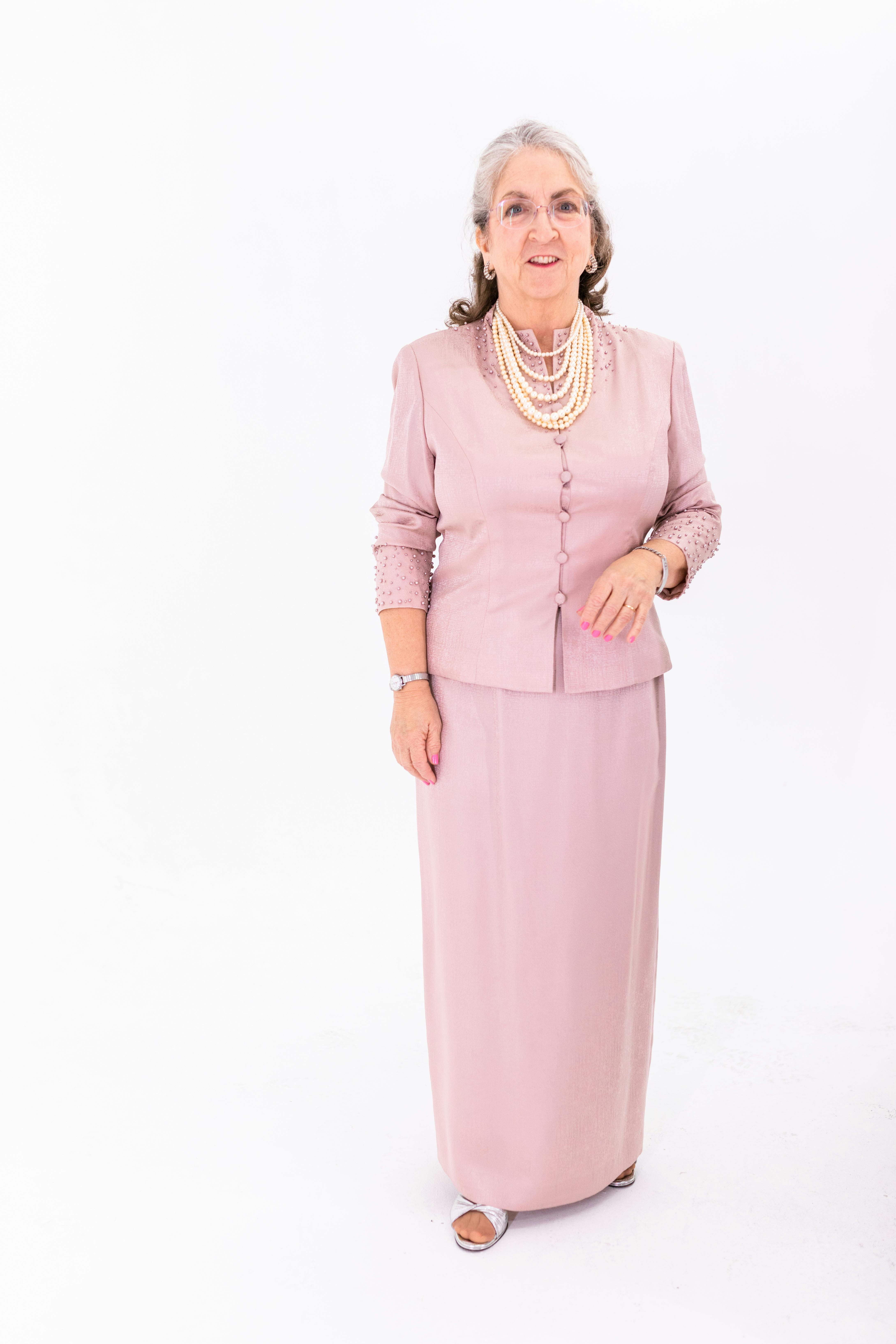 Elderly Woman in Pink Long Sleeve Dress · Free Stock Photo