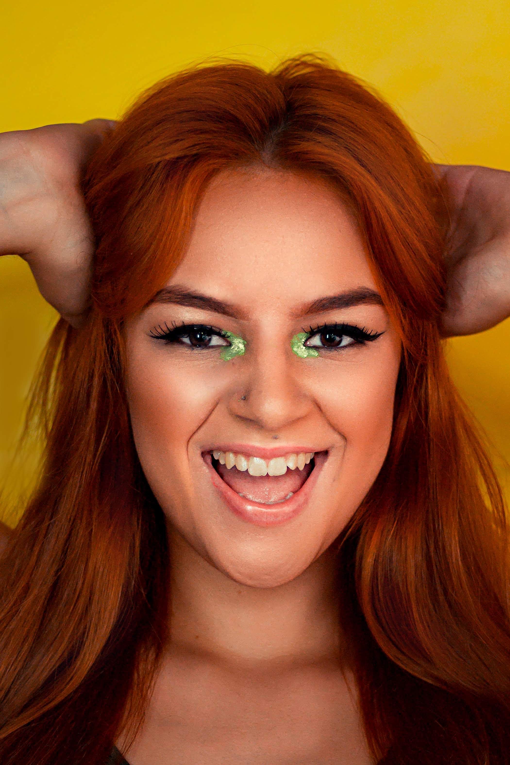 Portrait of a Woman with Red Hair Smiling · Free Stock Photo