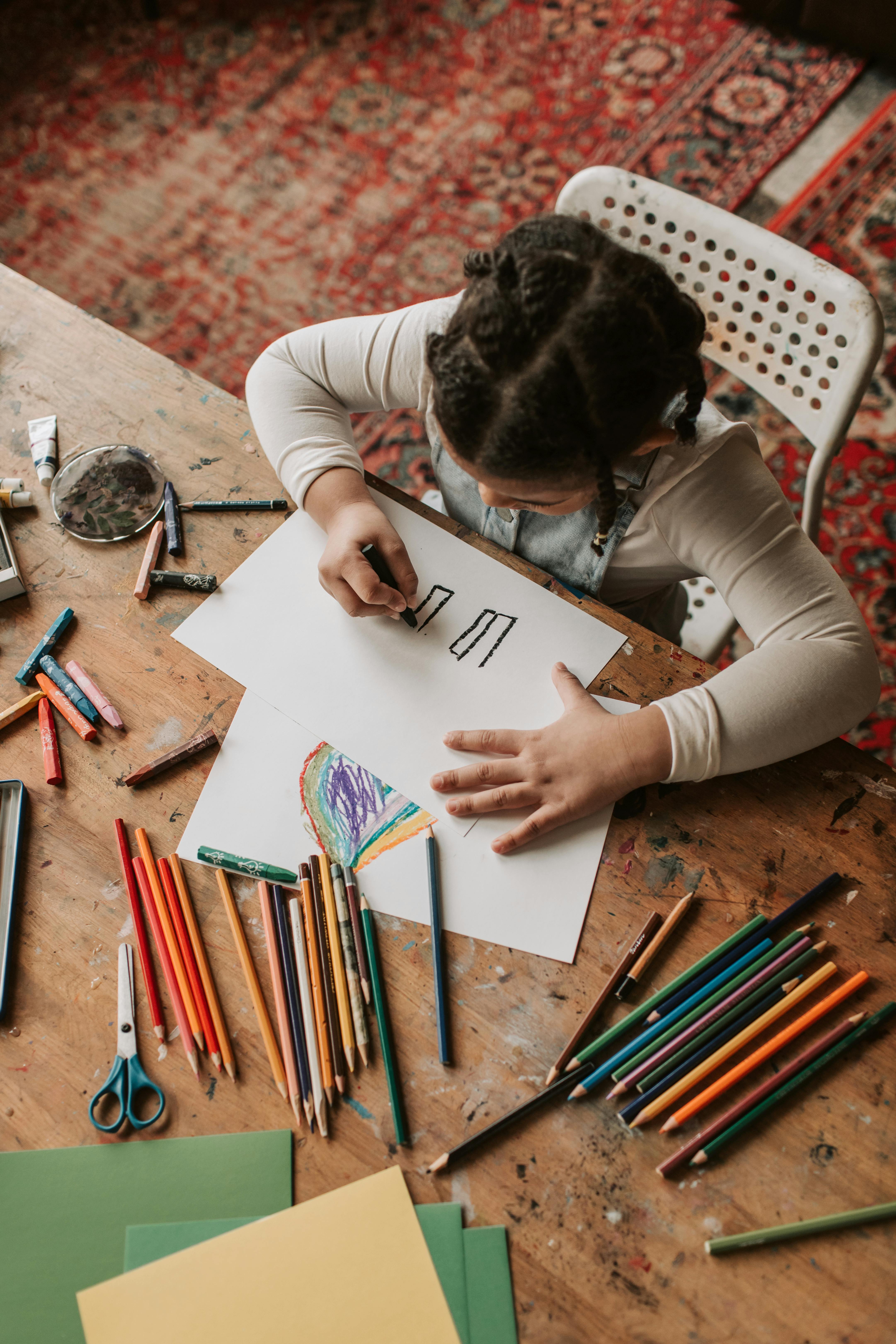 Photo of a Girl Drawing · Free Stock Photo