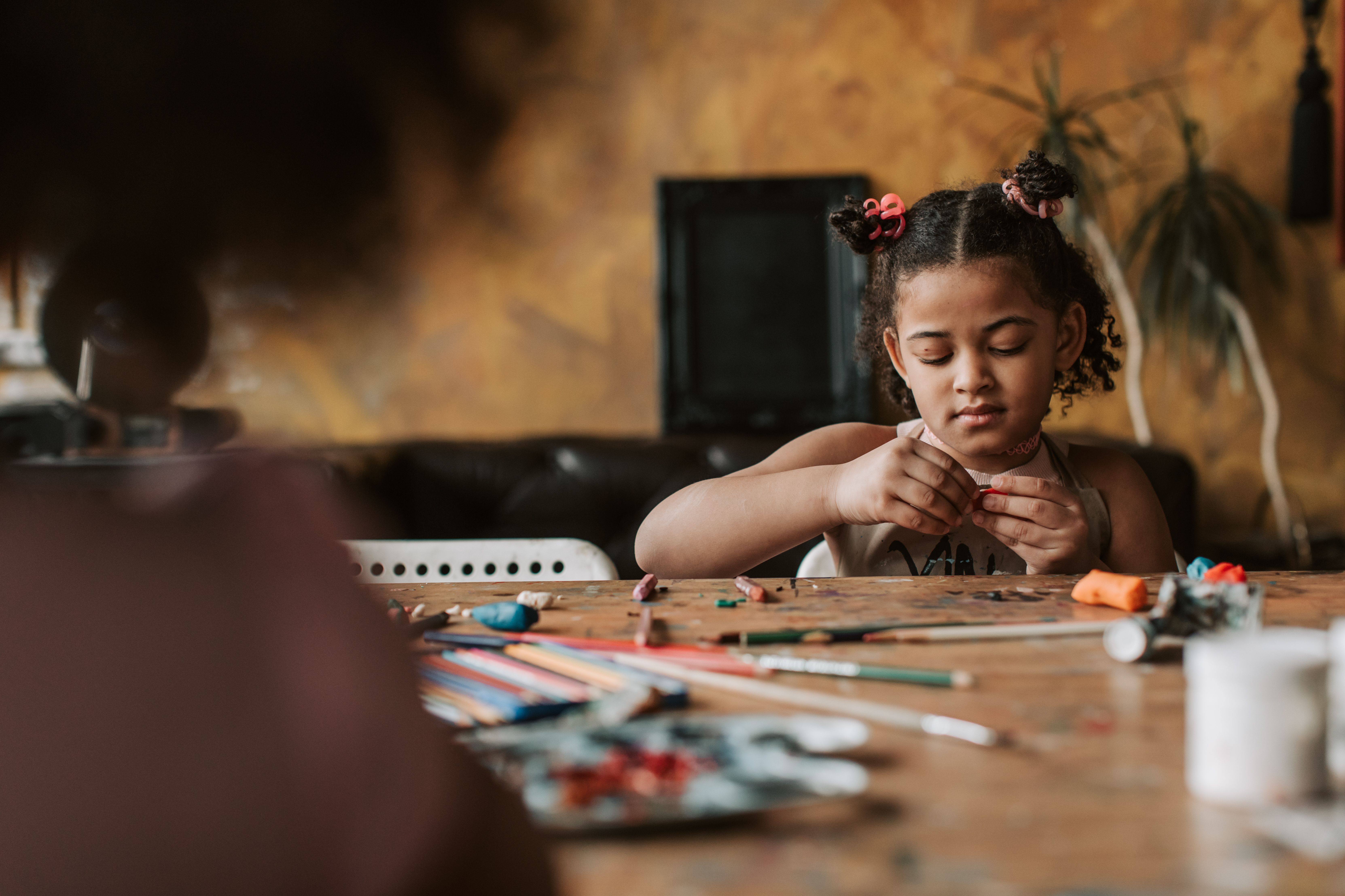 Photo of a Girl Playing with Clay · Free Stock Photo