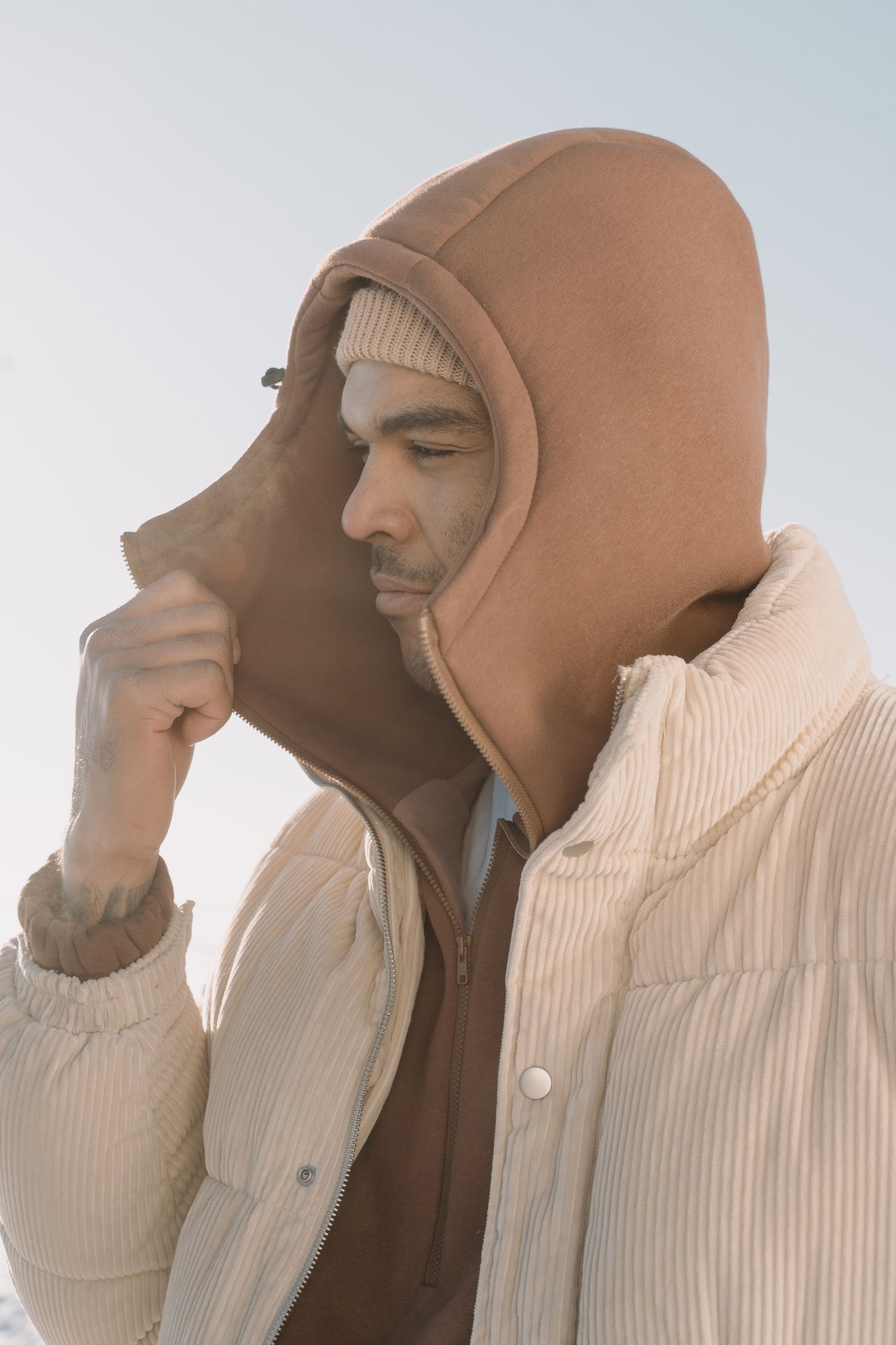 Man in Blue Bubble Jacket · Free Stock Photo