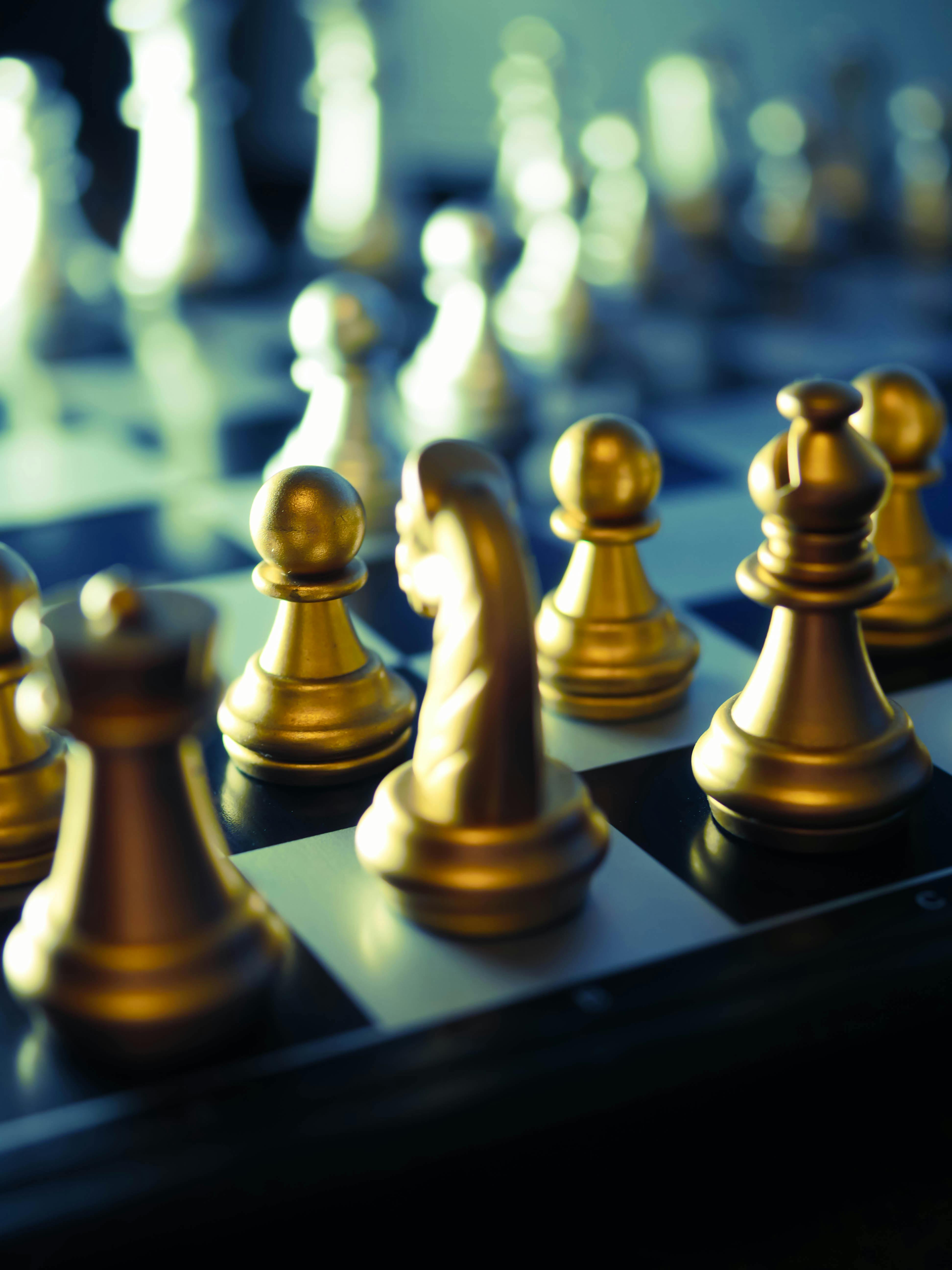 Gold Chess Pieces on the Chess Board · Free Stock Photo