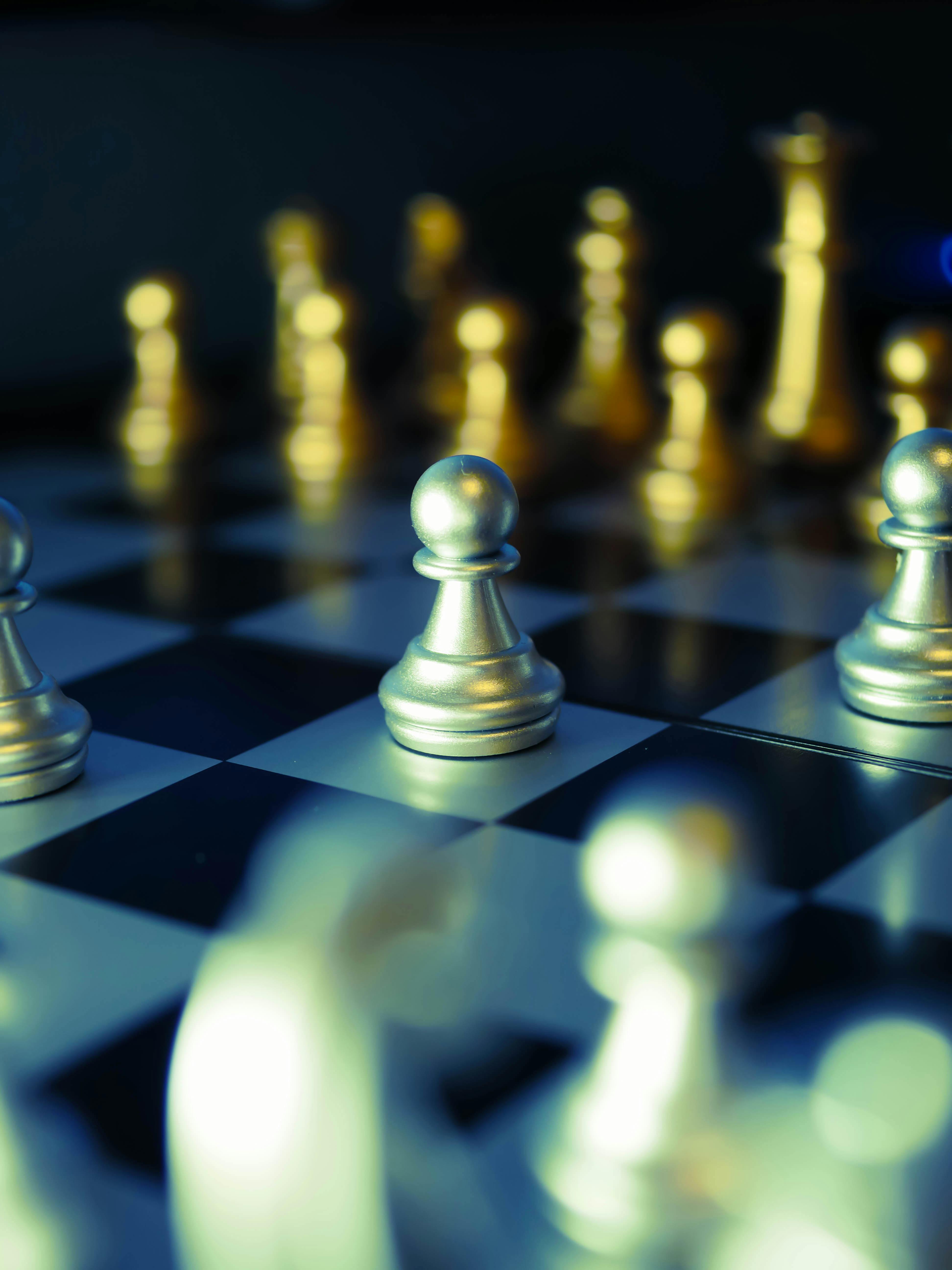 Gold Chess Pieces on the Chess Board · Free Stock Photo