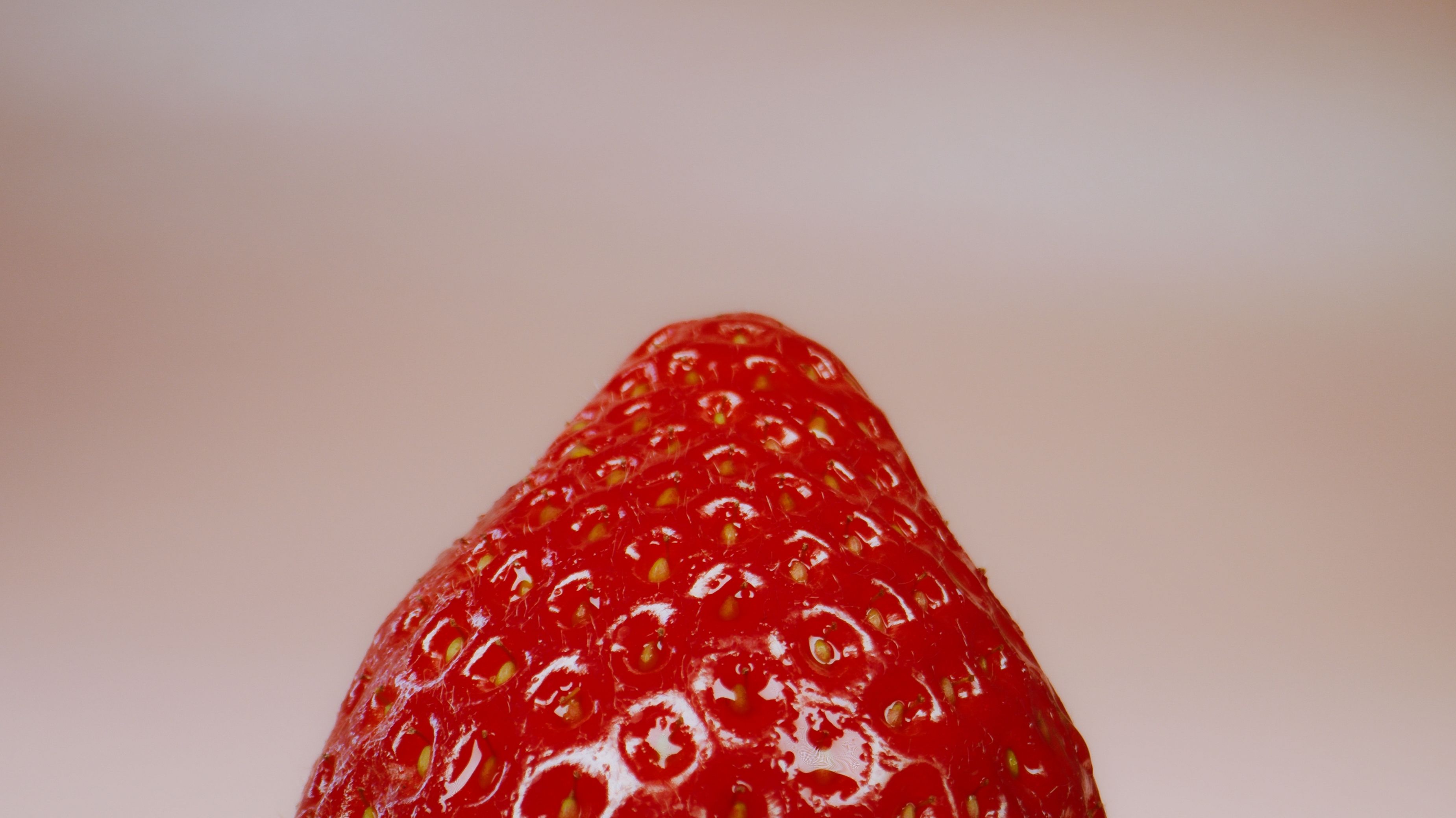 Strawberry on Pink Surface · Free Stock Photo