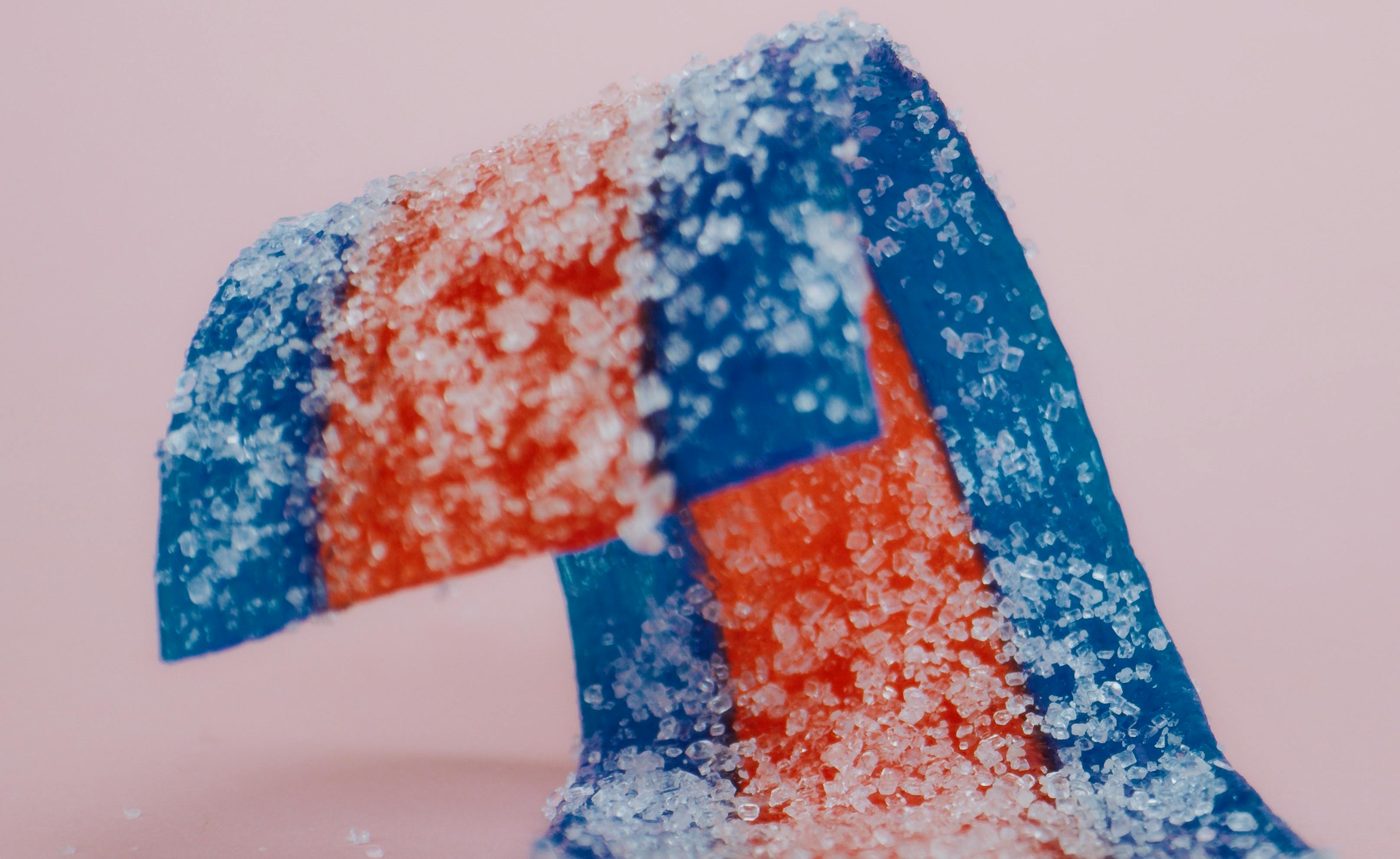 Close-Up Photo of a Blue and Red Candy · Free Stock Photo