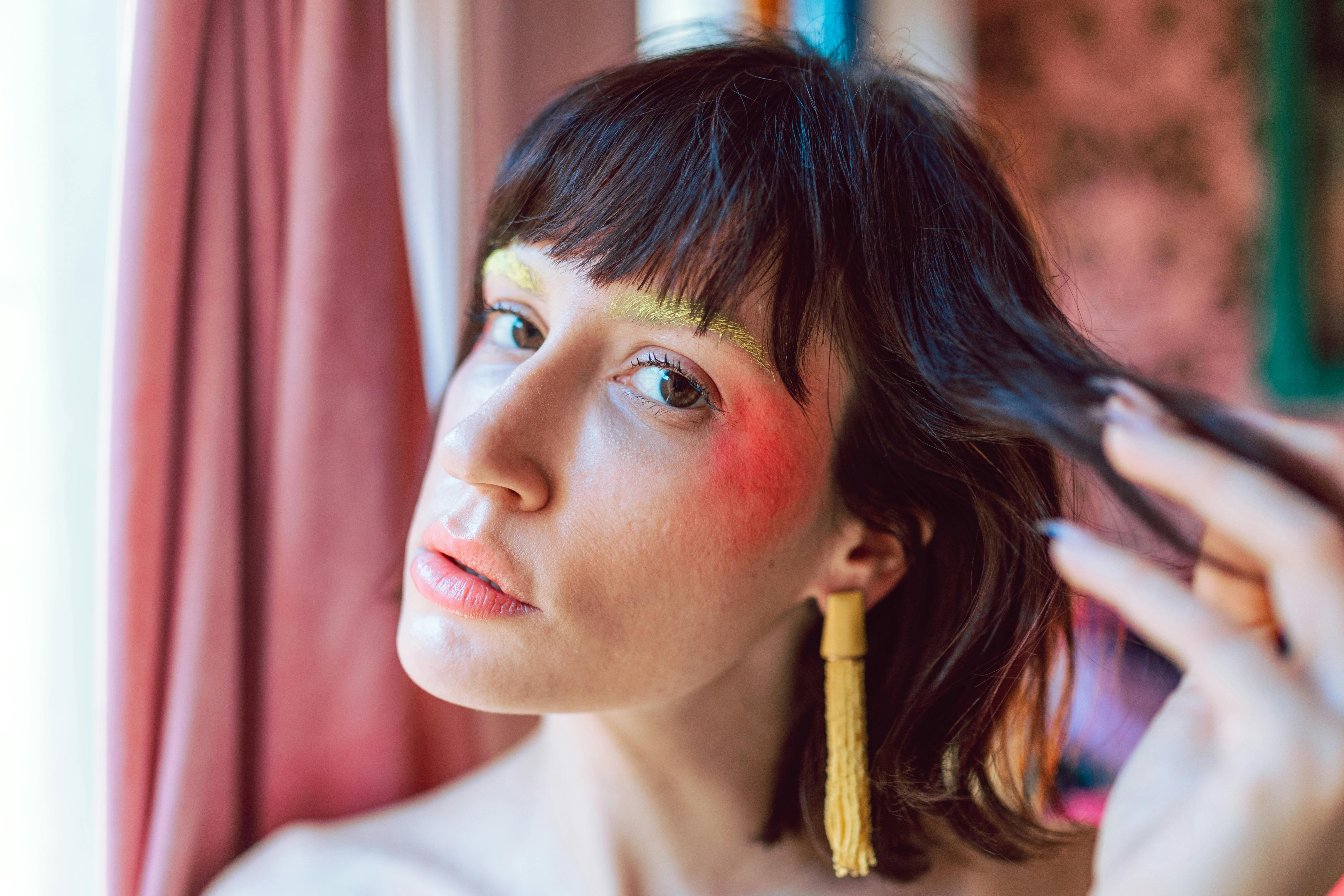 Photo of a Woman with Yellow Eyebrows · Free Stock Photo