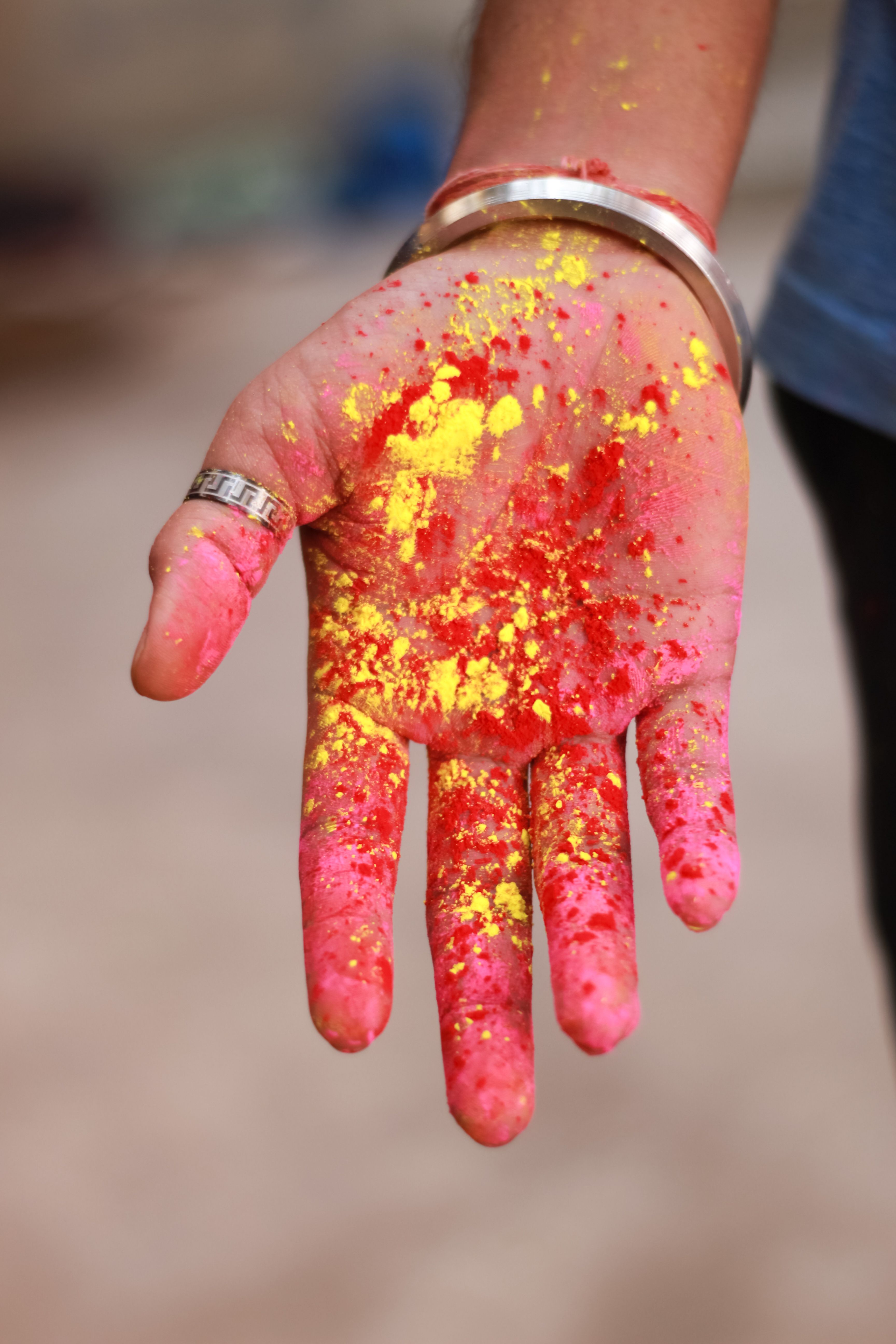 Person's Hand Full Of Colored Powder · Free Stock Photo