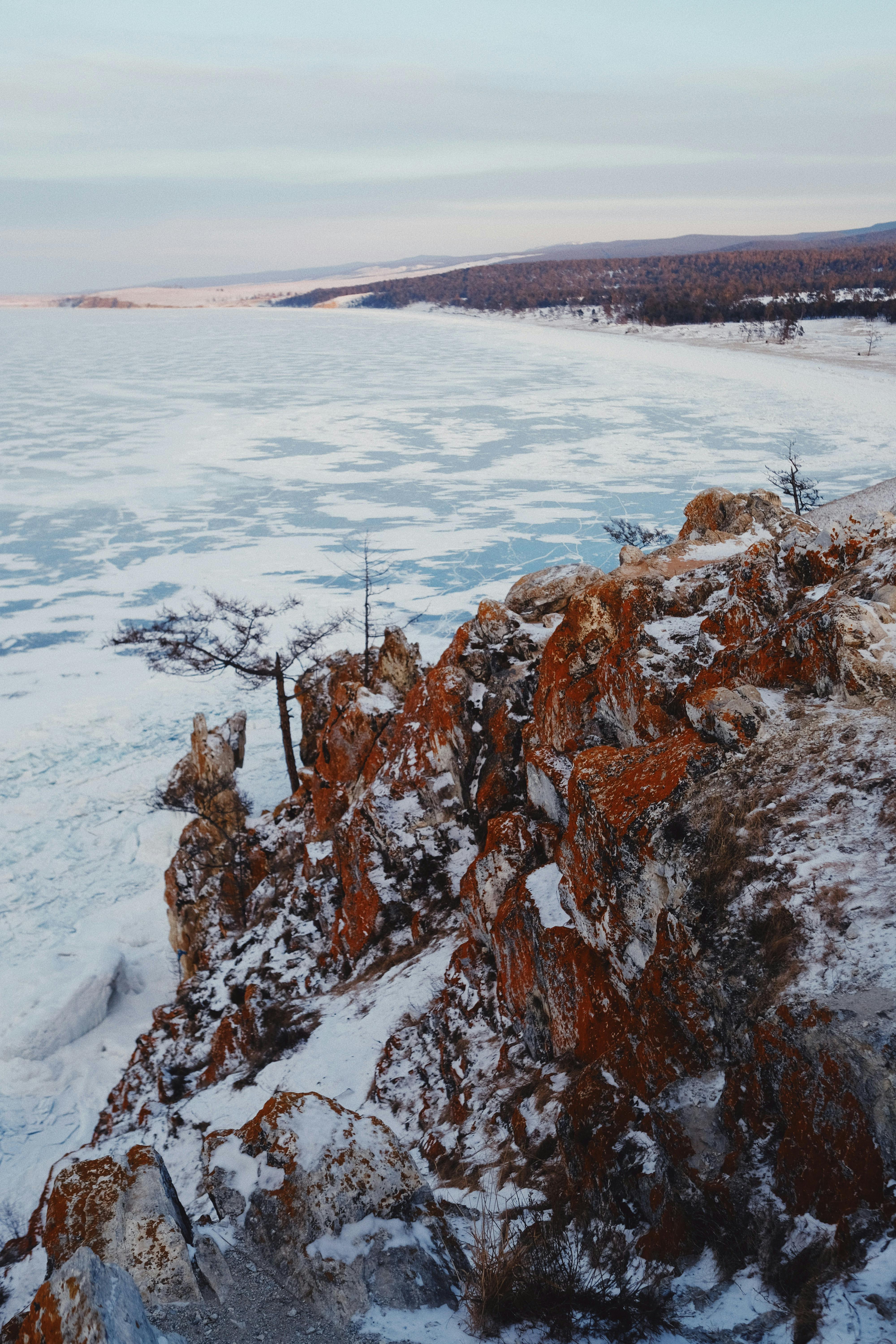 Coastal Mountain Cliff Covered with Snow · Free Stock Photo
