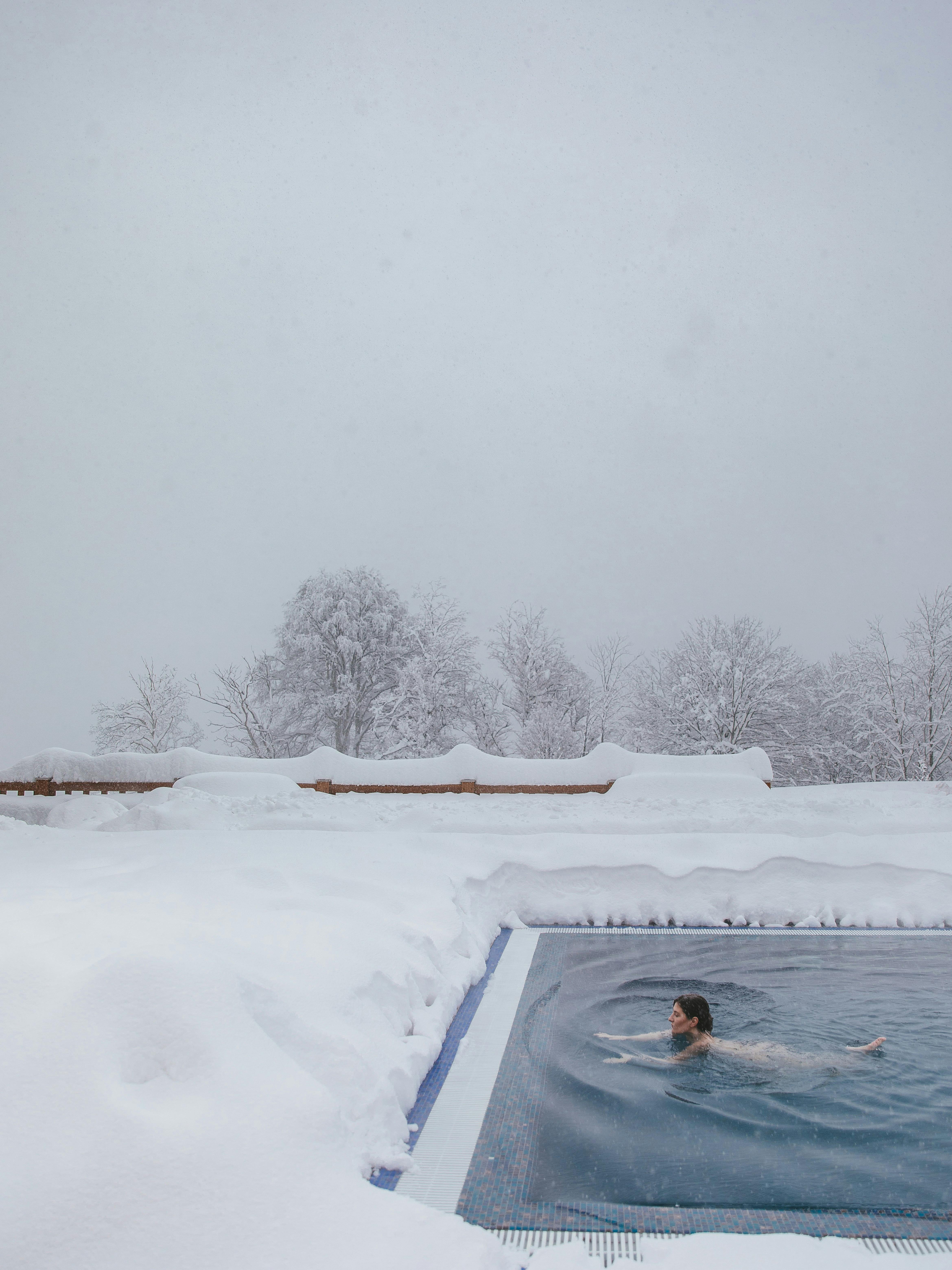 A Person Swims In Ice Pool Photos, Download The BEST Free A Person ...