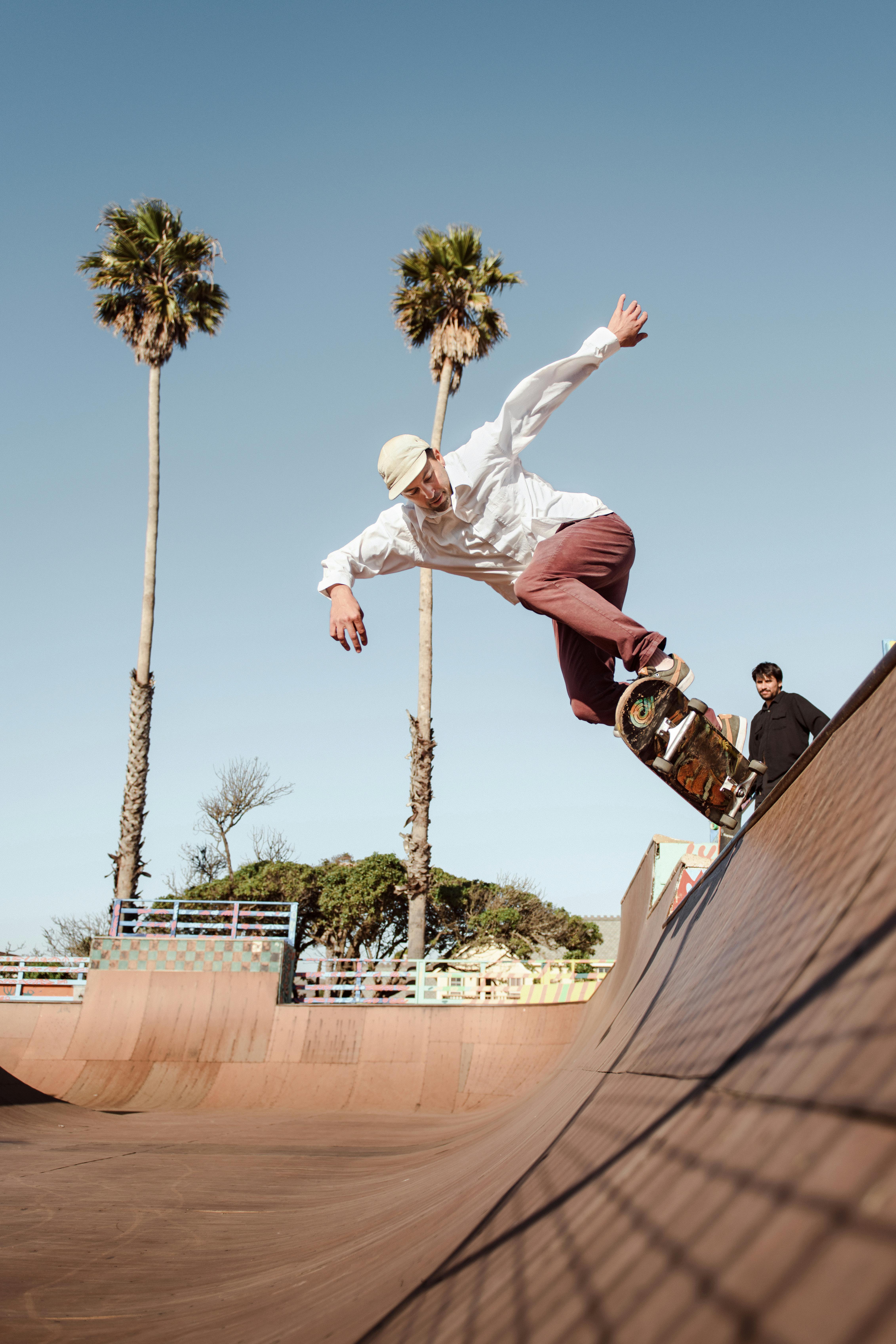 Person Skating on Skateboard Ramp · Free Stock Photo