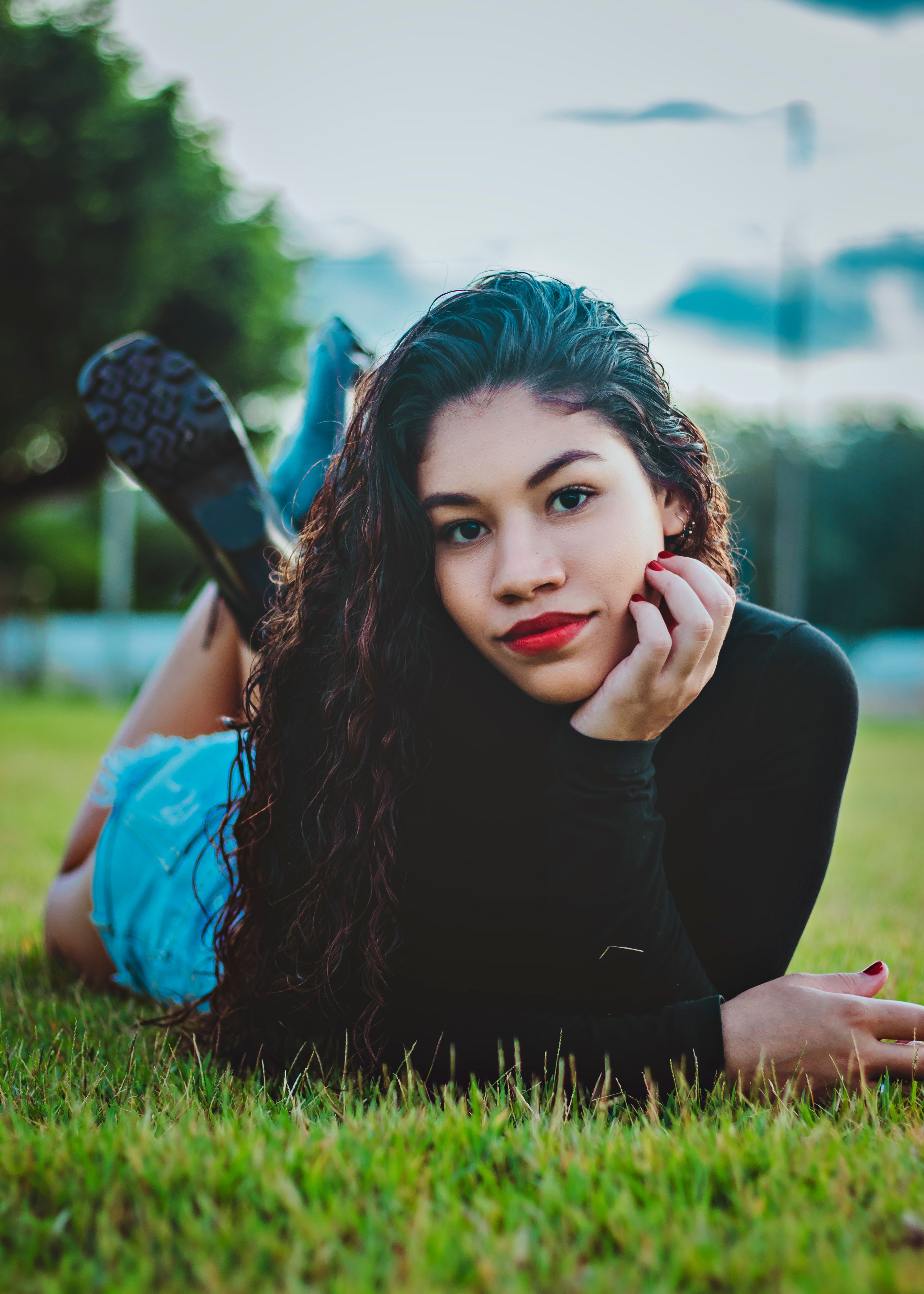Photo Of Woman Laying On Ground · Free Stock Photo