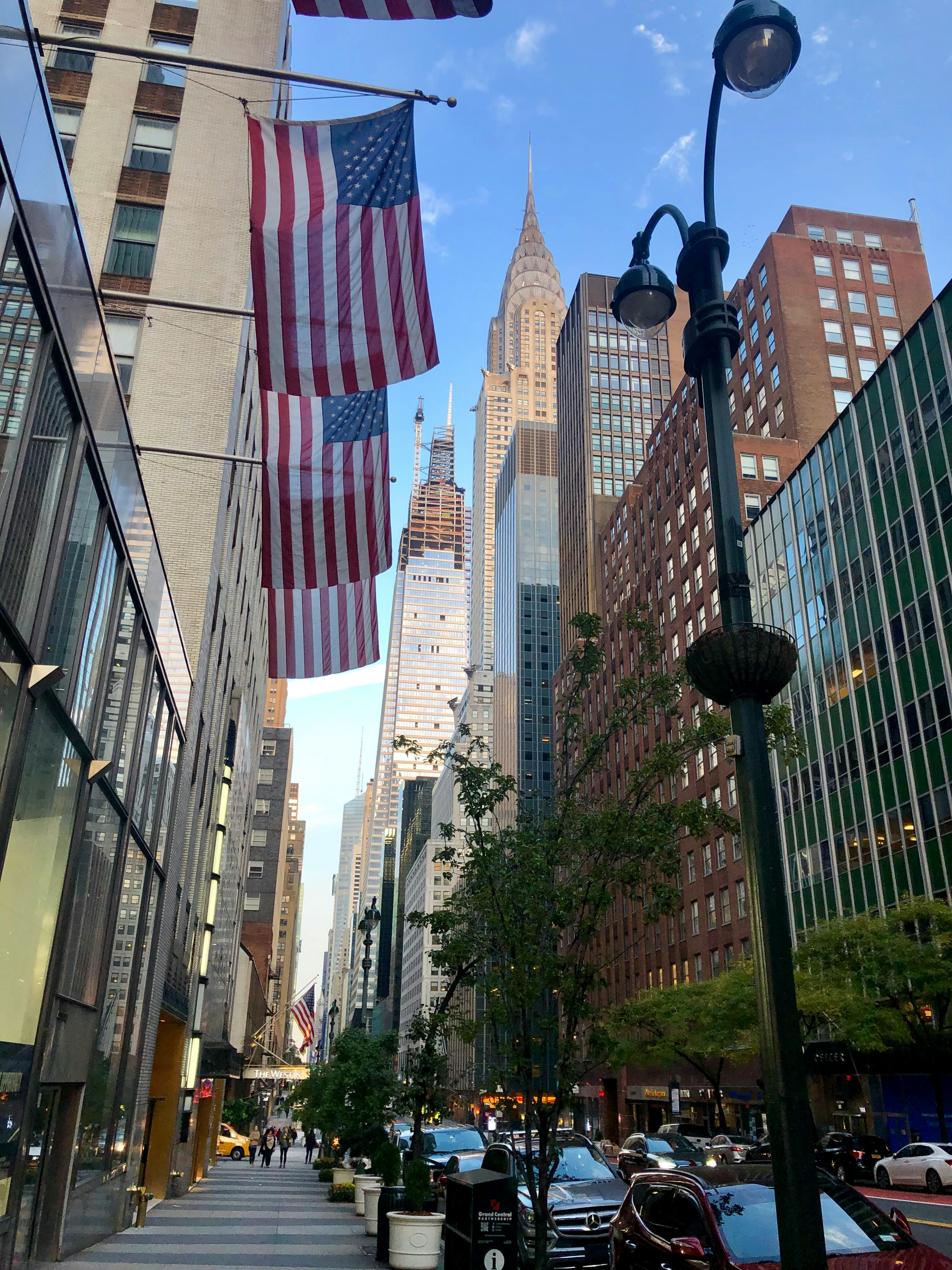 Flags Hanging on the Street · Free Stock Photo