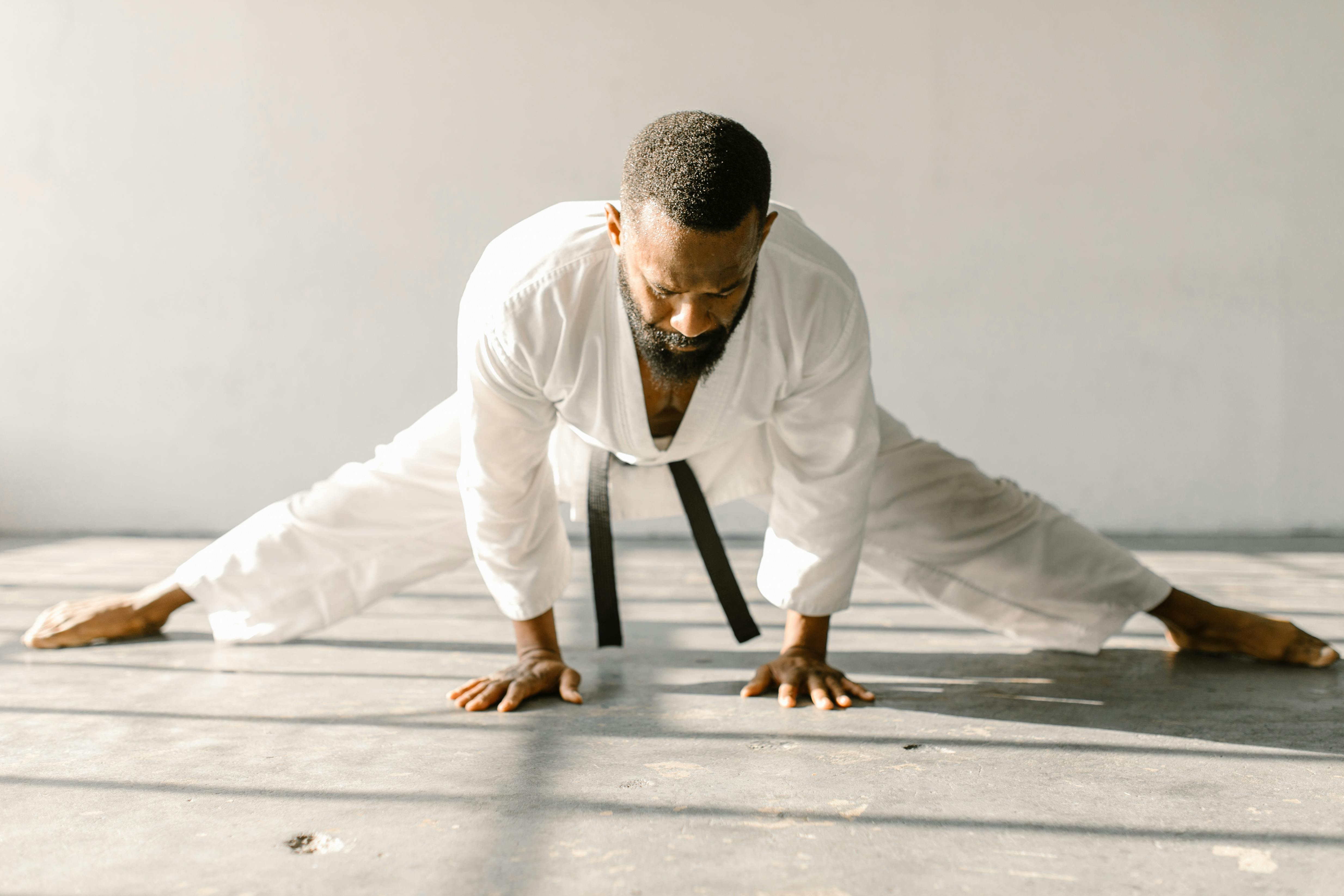 A Martial Artist Doing a Leg Split · Free Stock Photo
