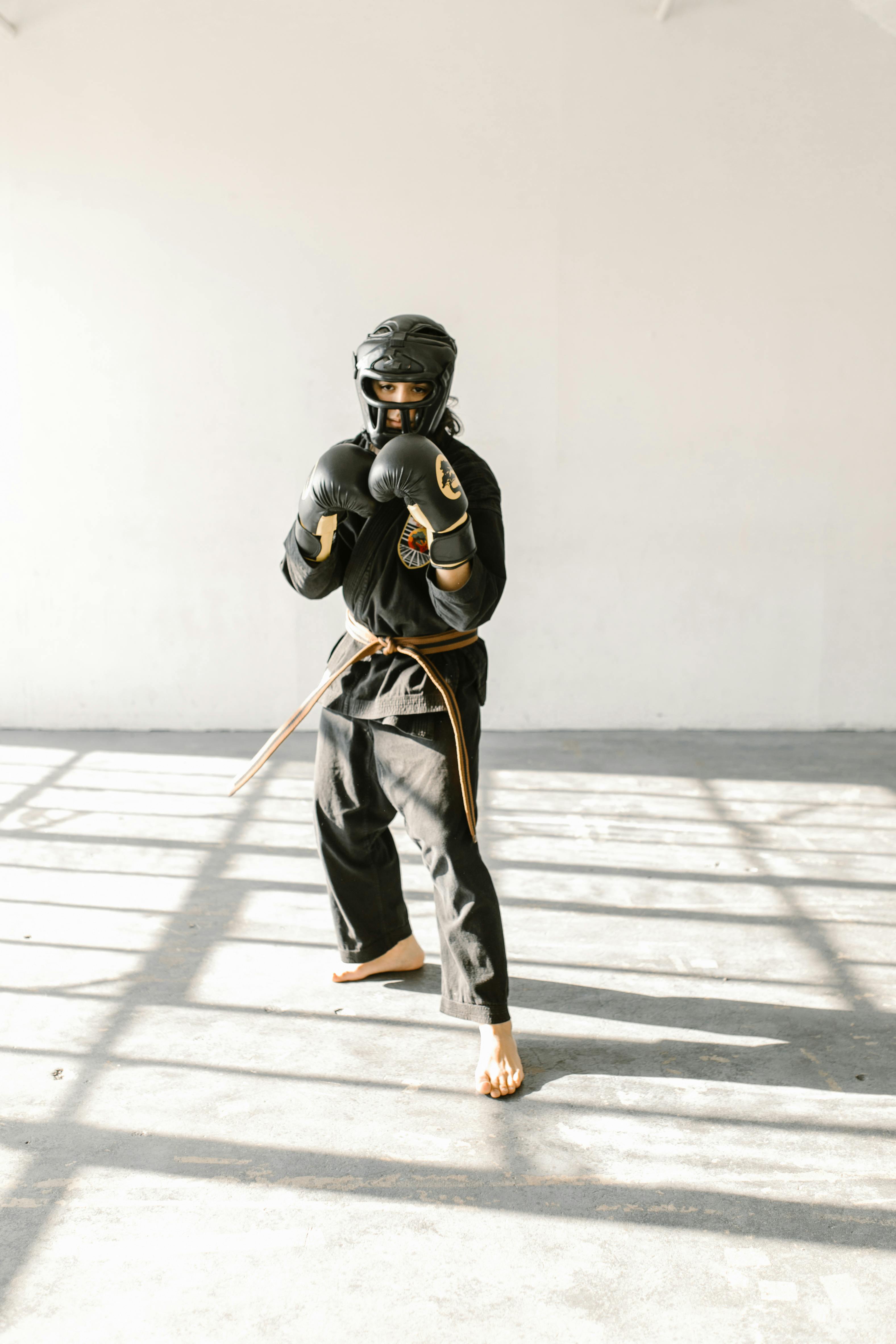 Photo of a Child Wearing Red Dobok · Free Stock Photo