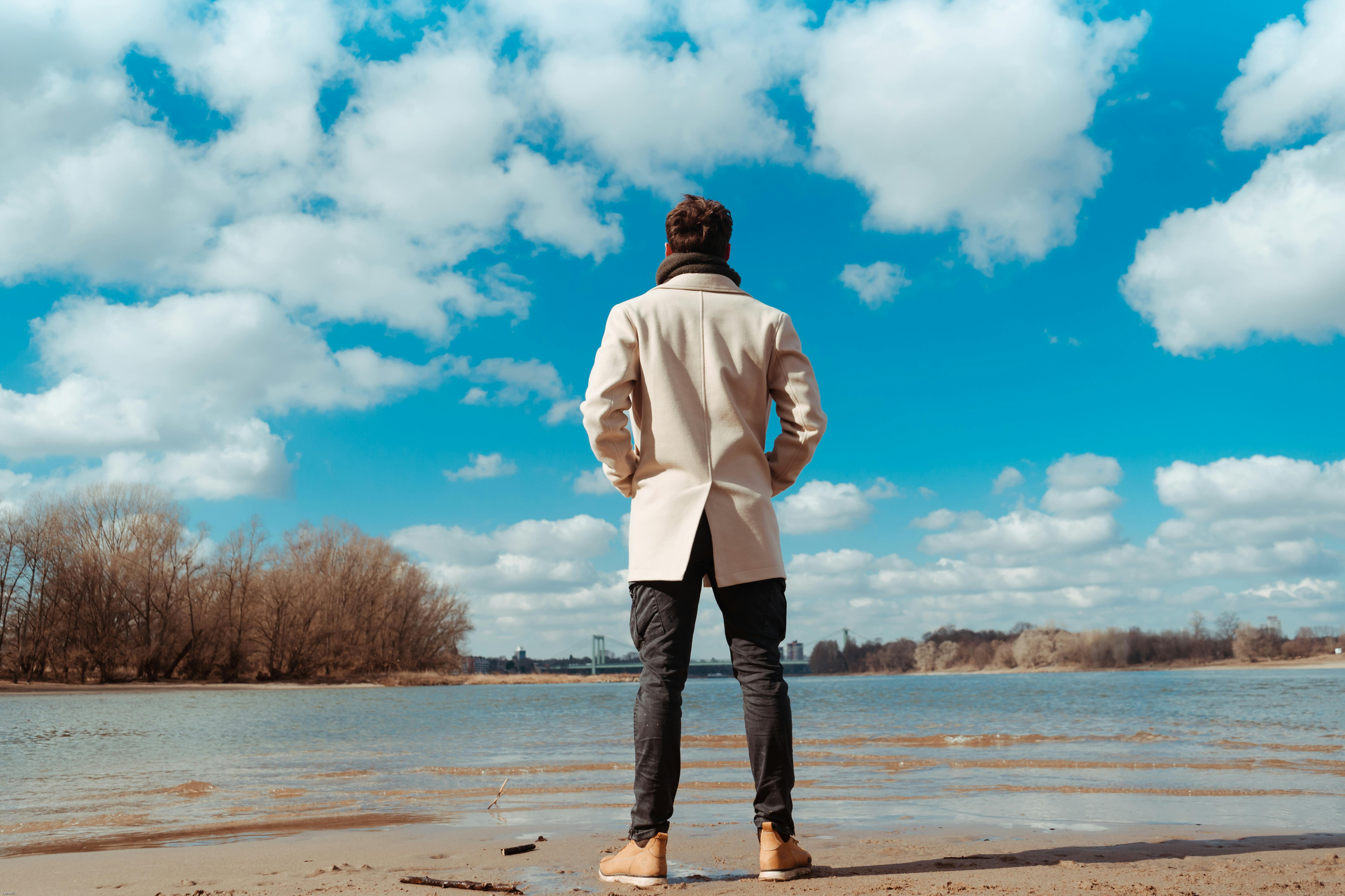 A Man Jumping on Mid Air Under Blue Sky with White Clouds · Free Stock ...