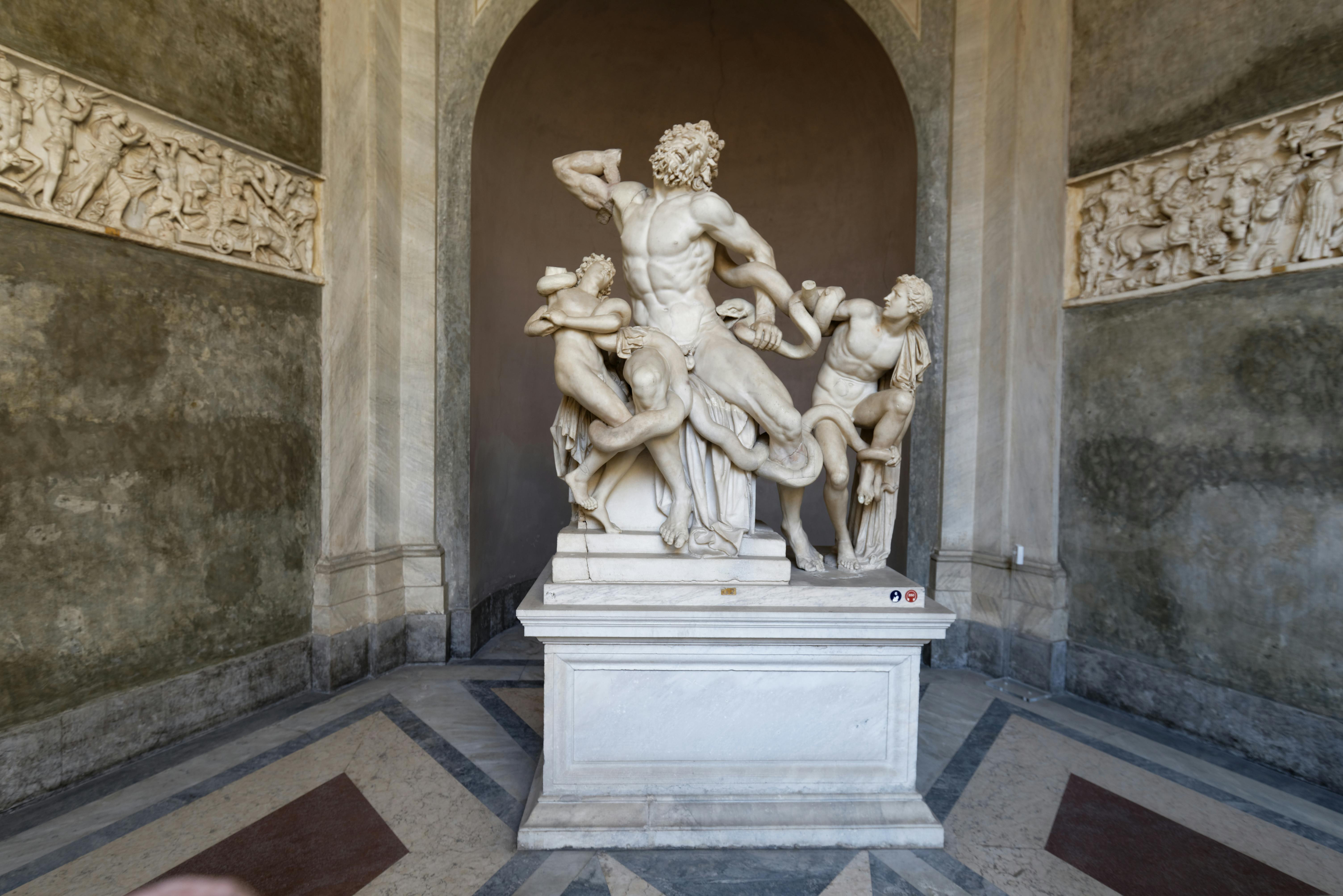 A White Concrete Statue · Free Stock Photo