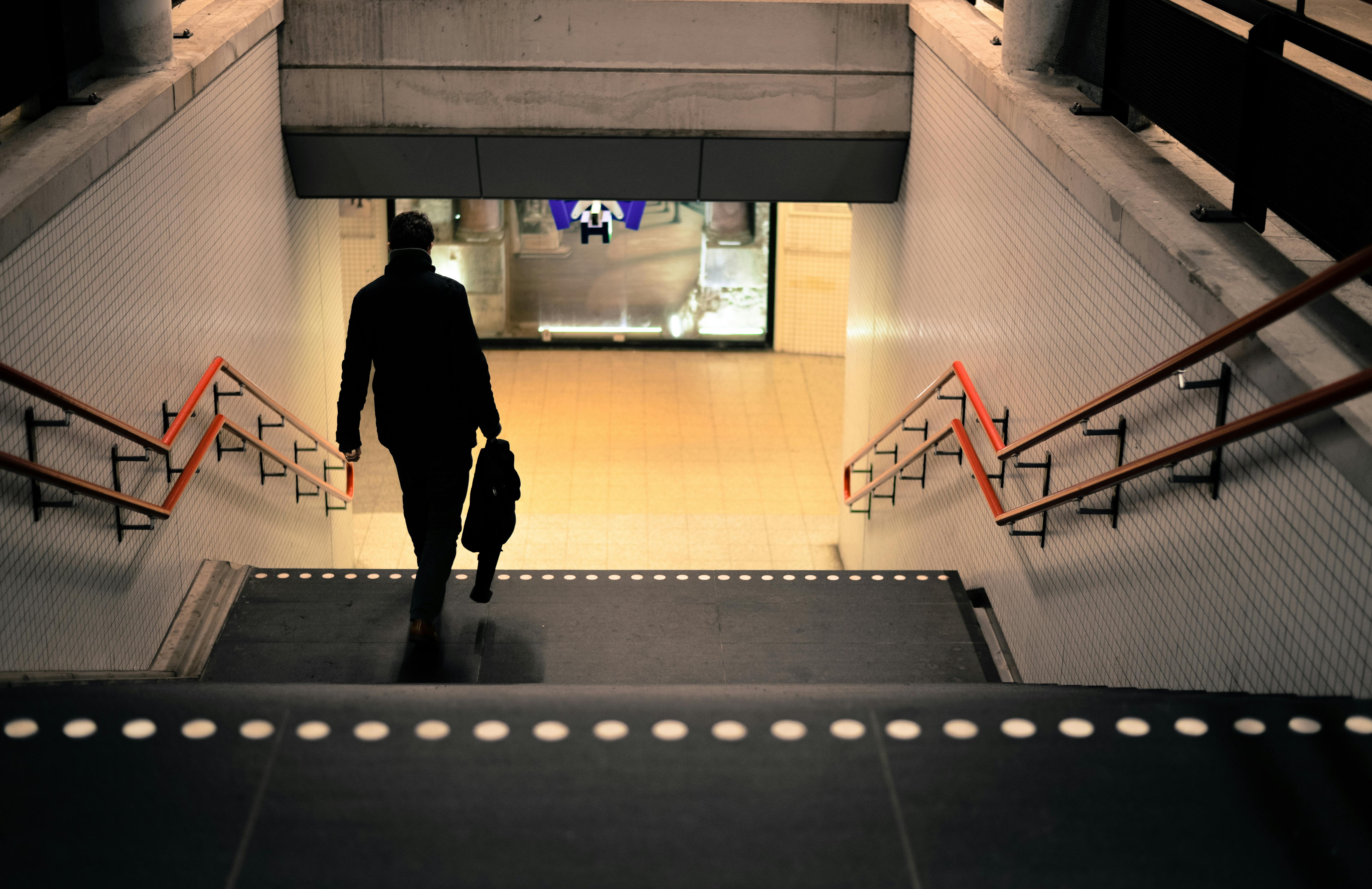 Photo Of Person Going Down The Stairs · Free Stock Photo