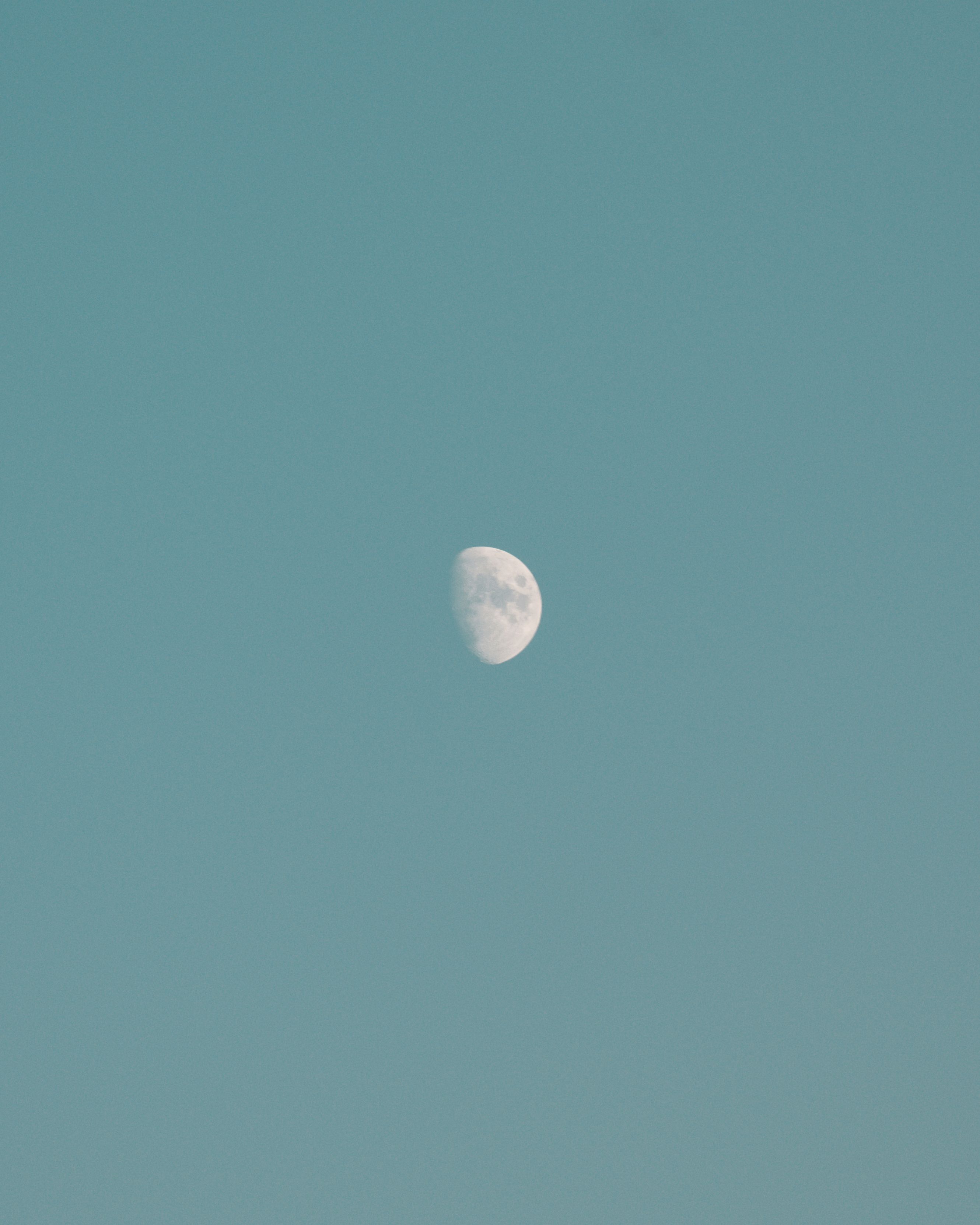 Spotted moon in violet sky in evening · Free Stock Photo