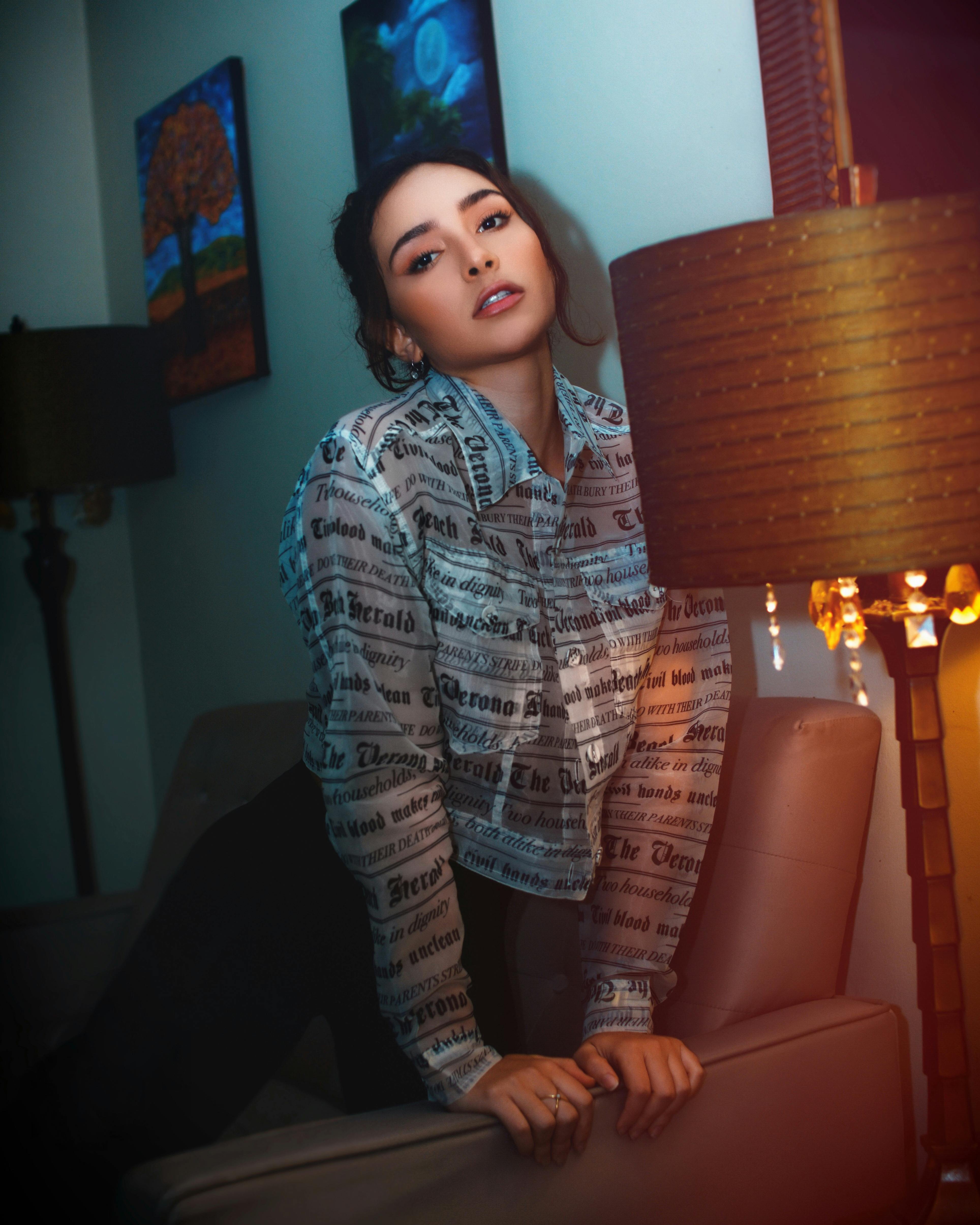 A Woman Wearing a Printed See Through Top · Free Stock Photo