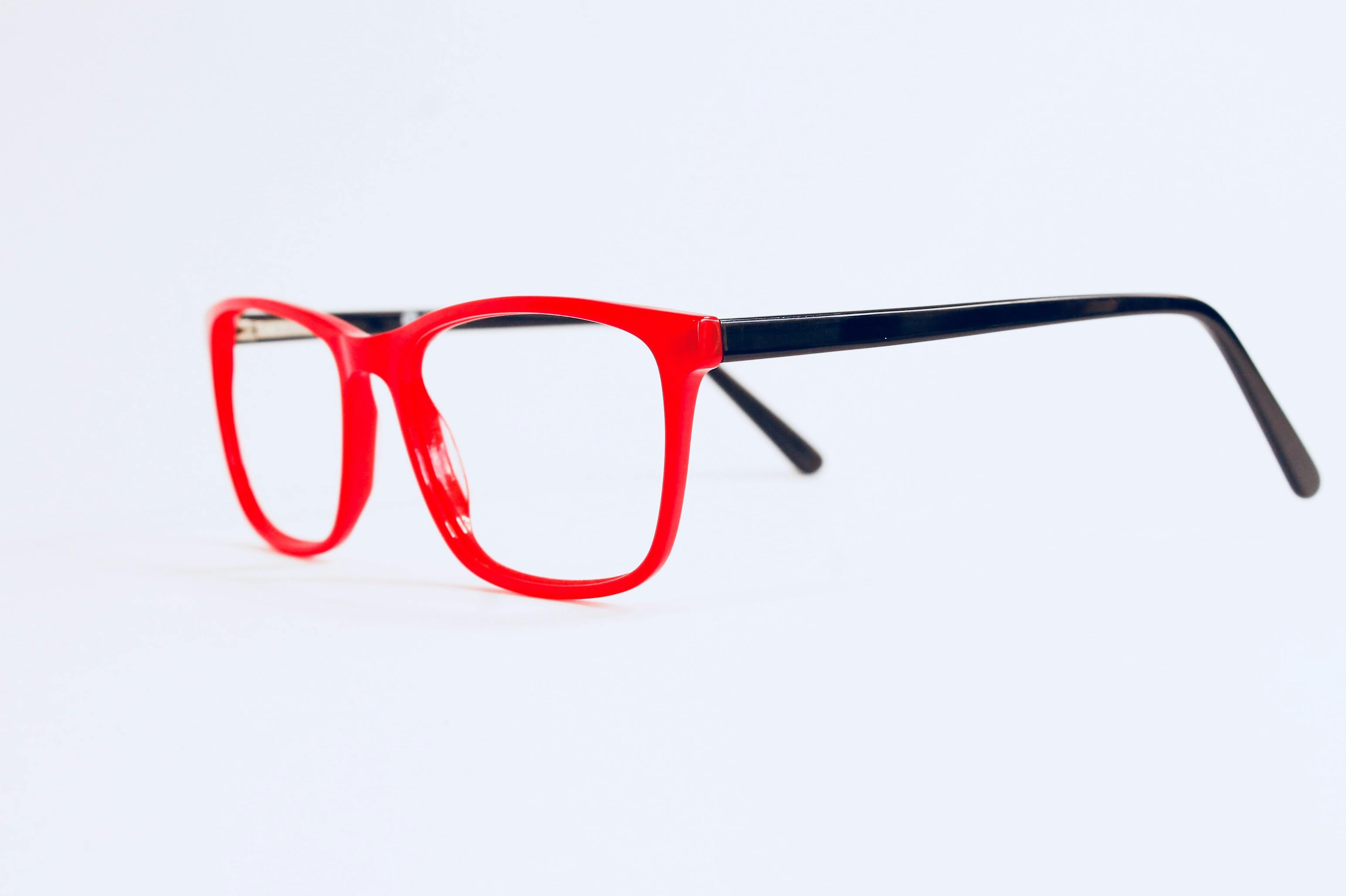 Person Holding Eyeglasses · Free Stock Photo