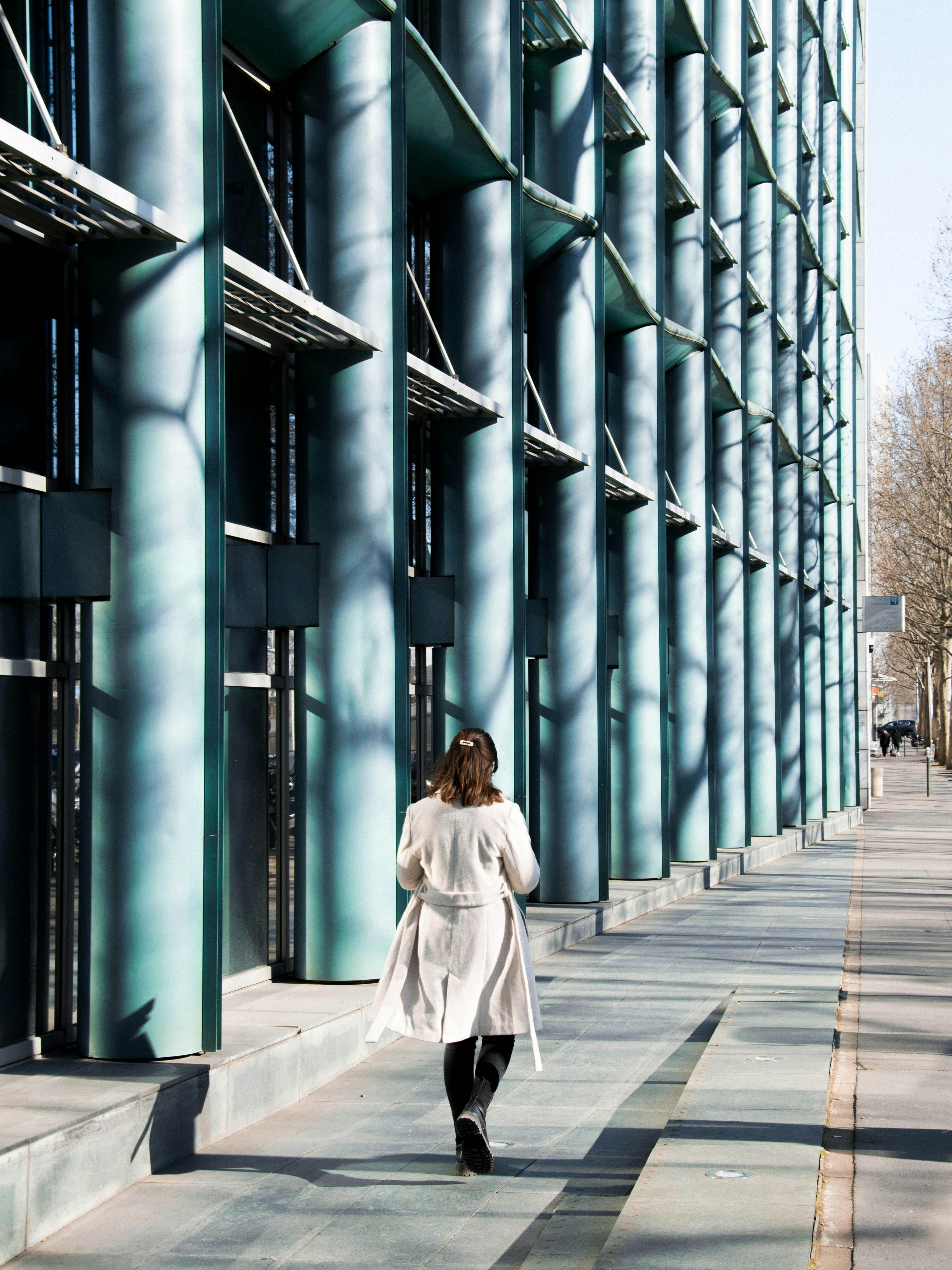 Person Looking Over the Concrete Railing · Free Stock Photo