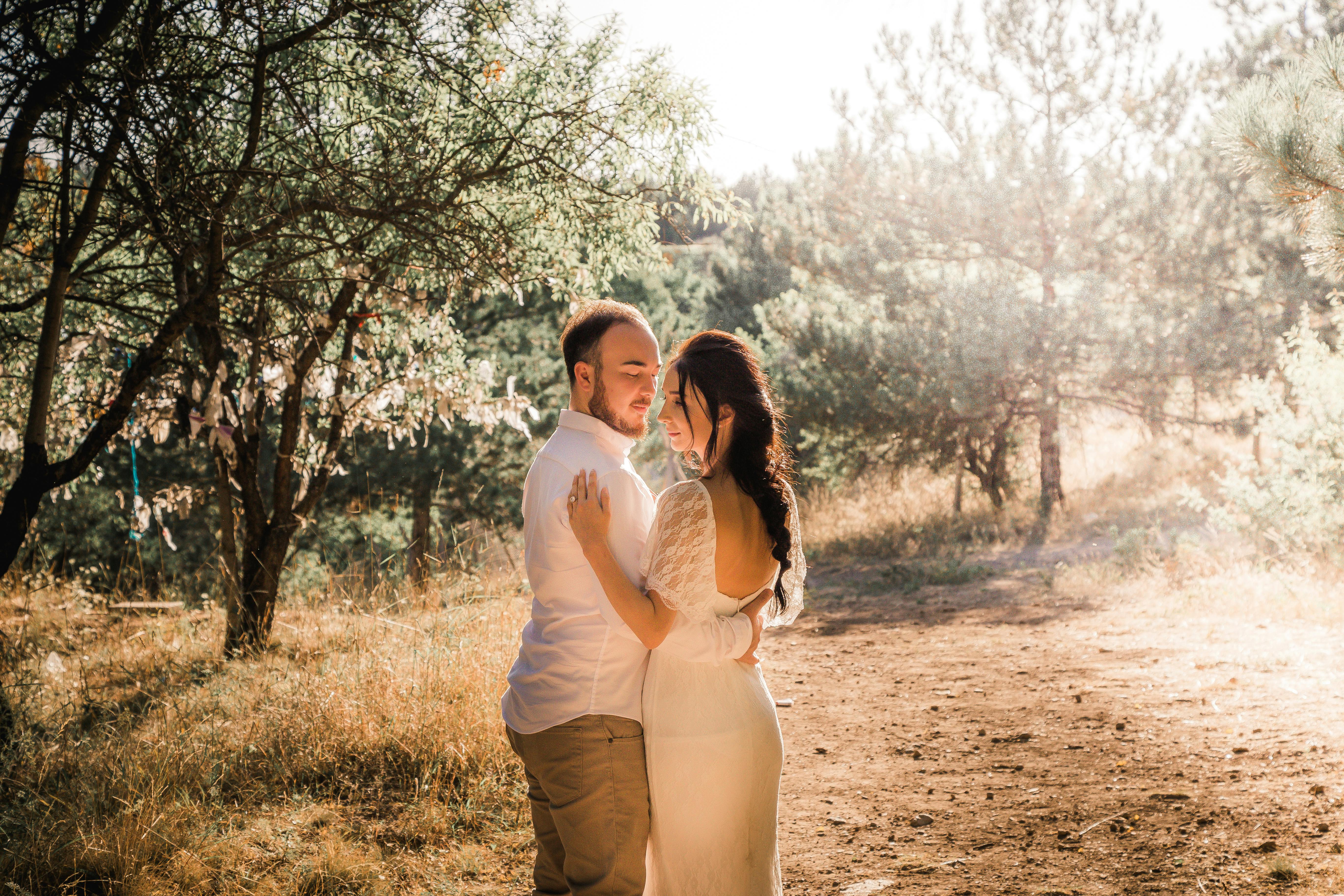 Couple Having a Photoshoot in the Woods · Free Stock Photo