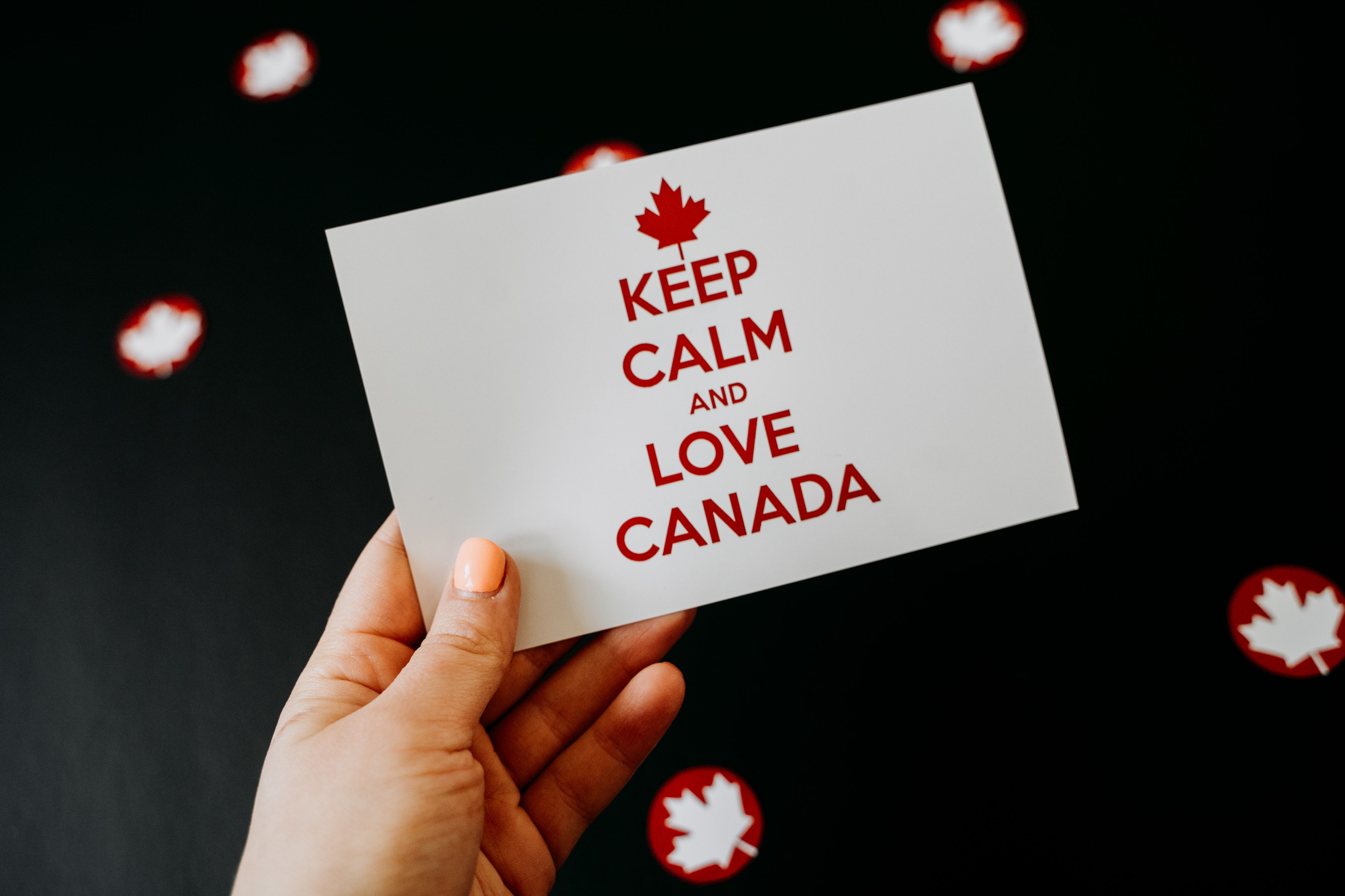 Close-up Shot of a Hand Holding a Card with Message · Free Stock Photo