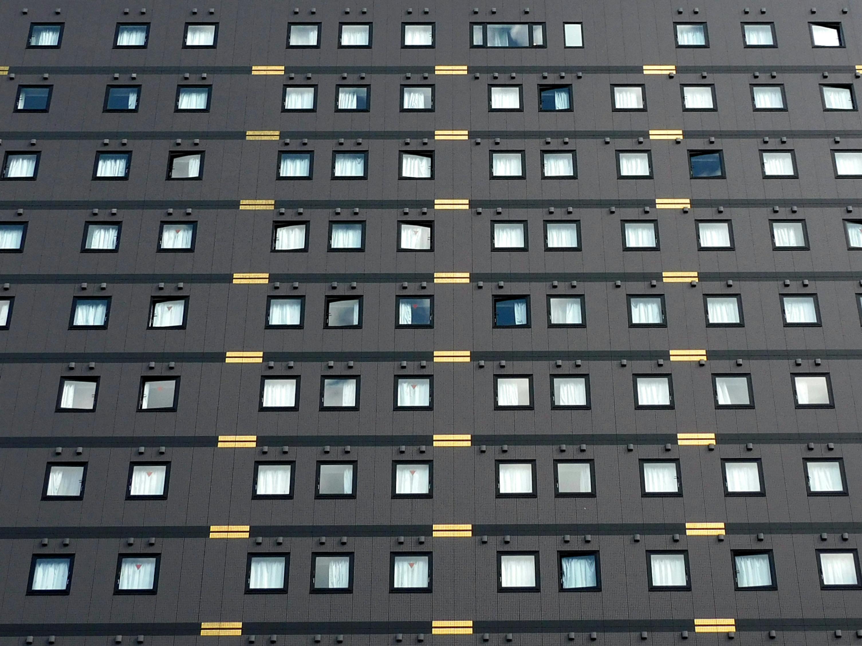 Rows of windows of modern building · Free Stock Photo