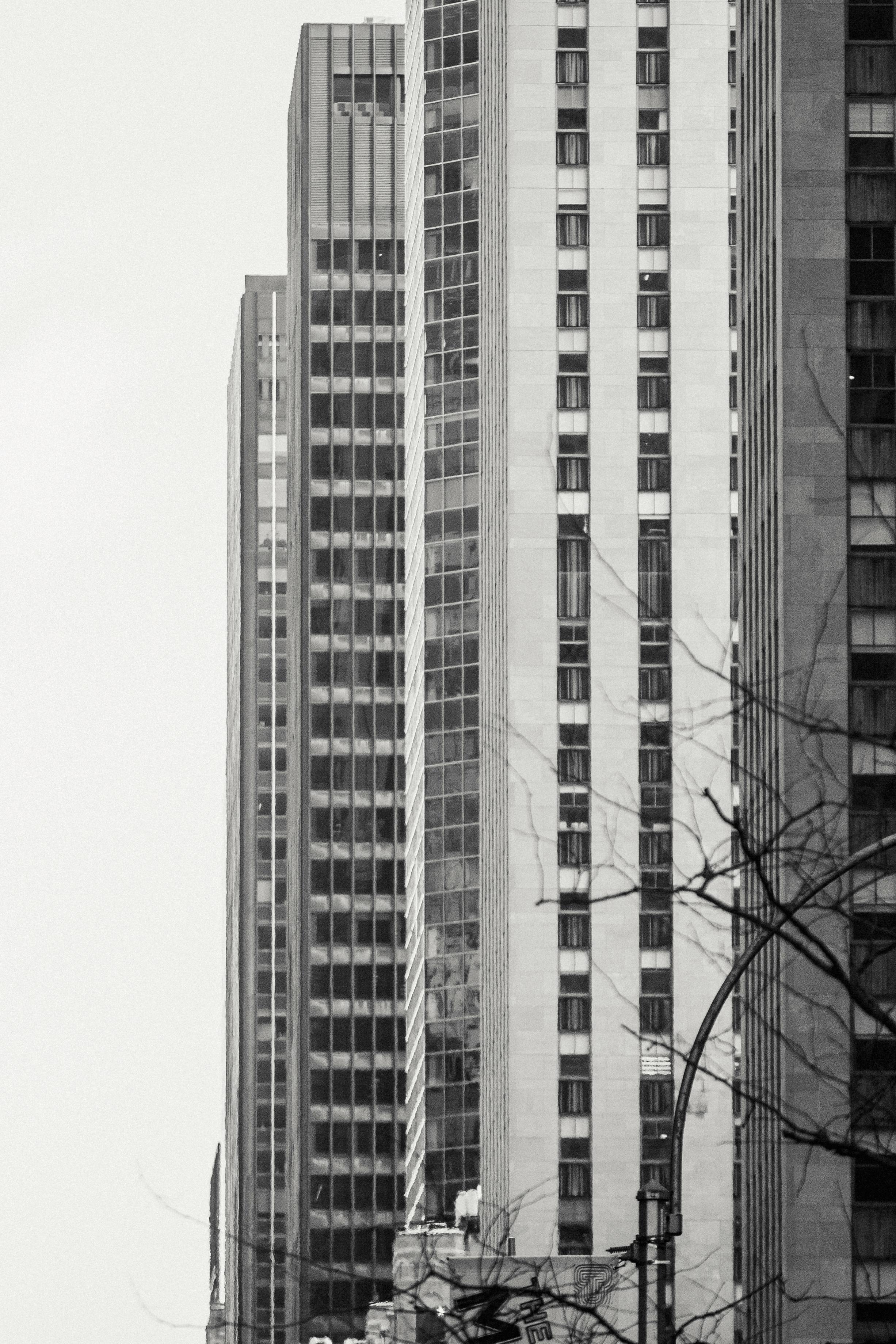 Tall modern gray building on urban street · Free Stock Photo