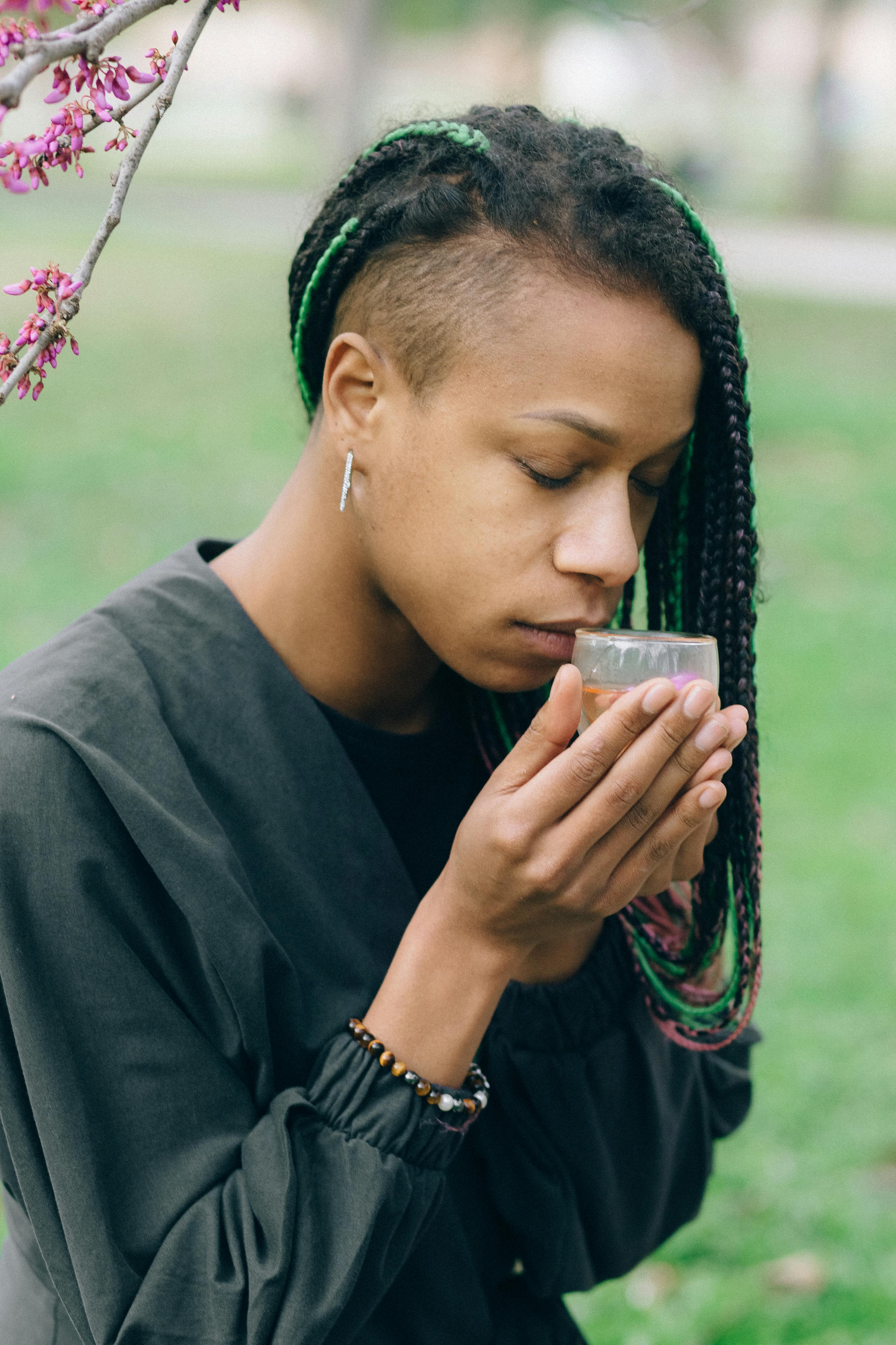 Close-up Photo of Woman Smelling Tea · Free Stock Photo