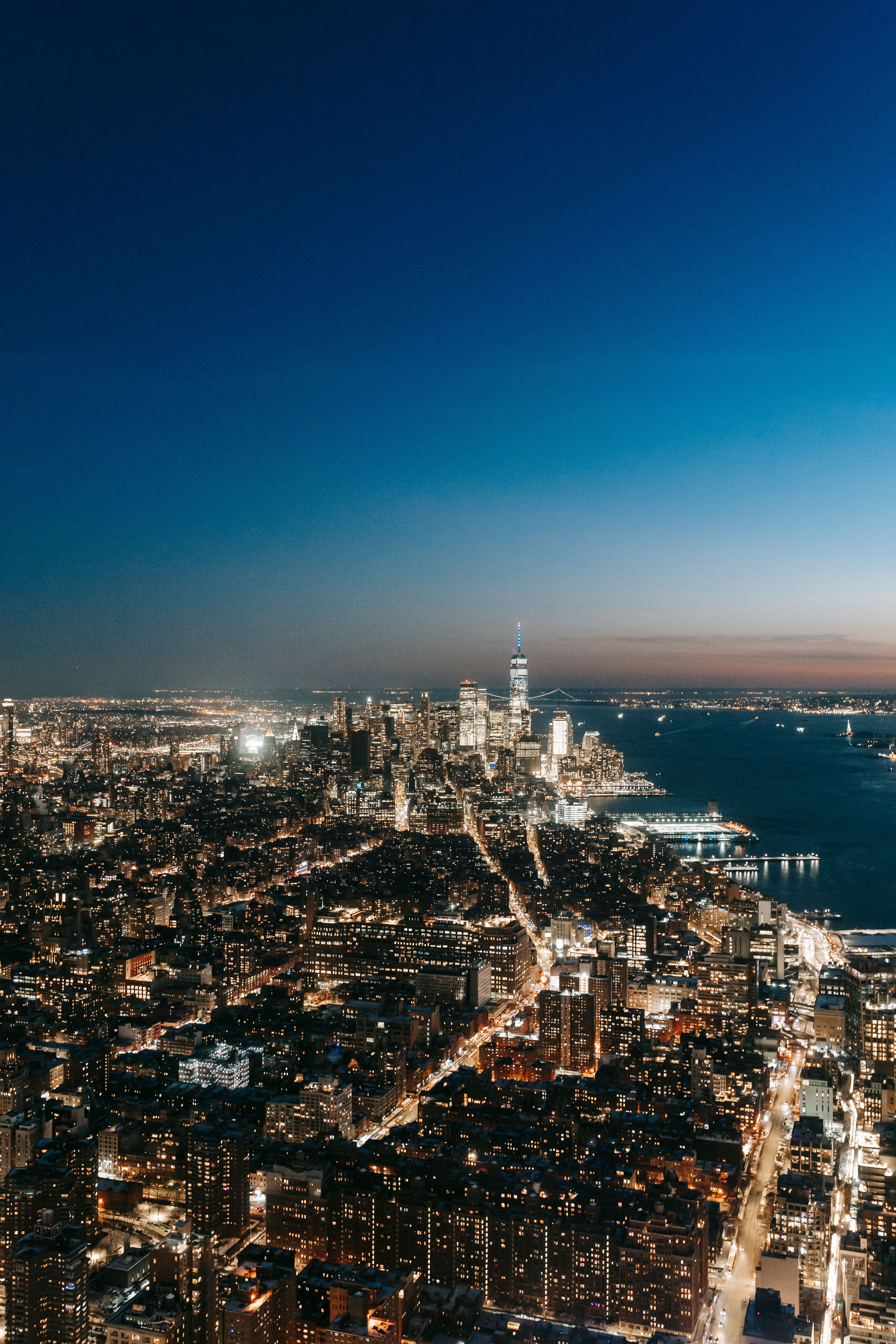 Illuminated buildings at night time · Free Stock Photo