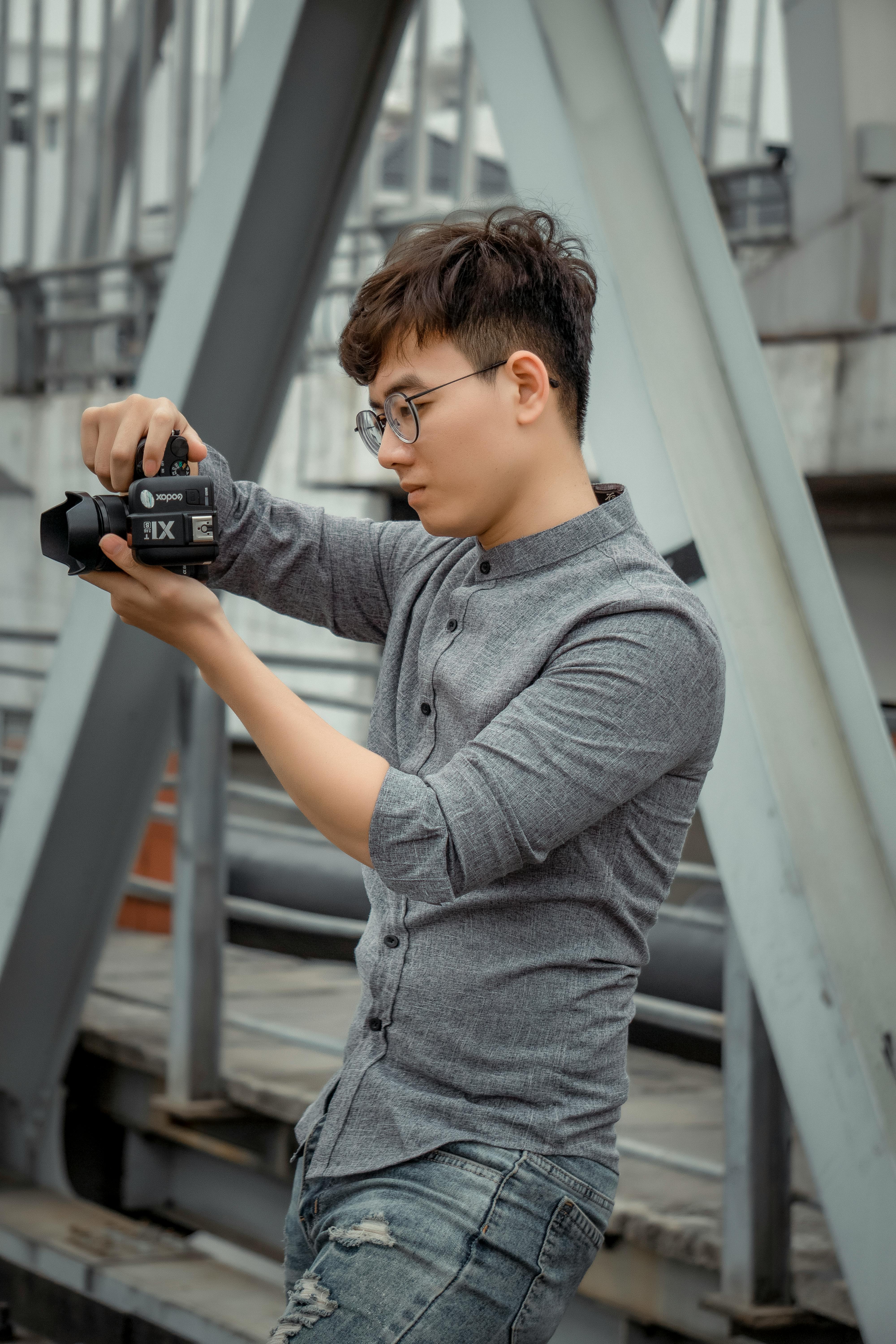 A Man using Camera · Free Stock Photo