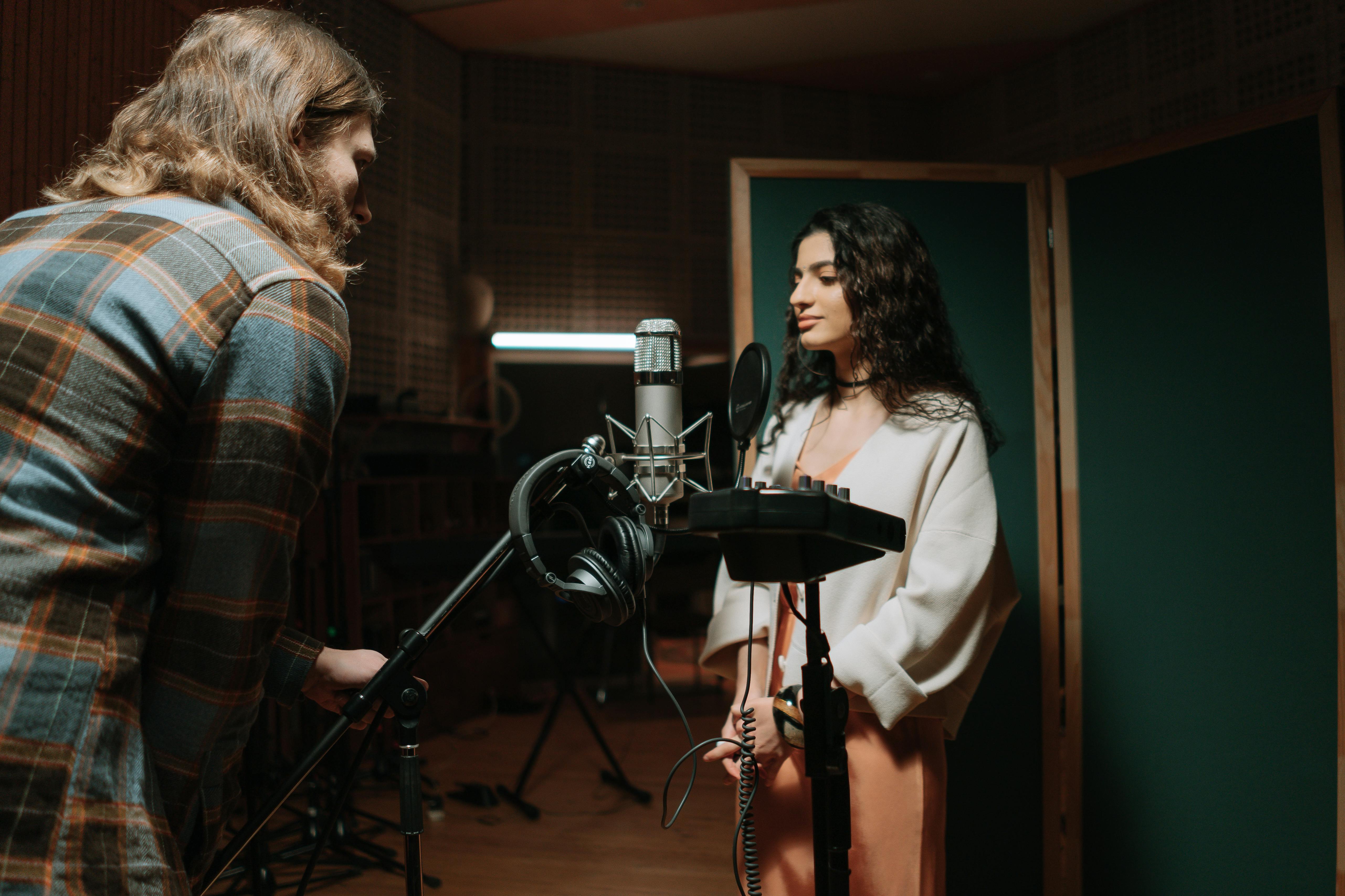 Photo of Woman Singing in Music Studio · Free Stock Photo