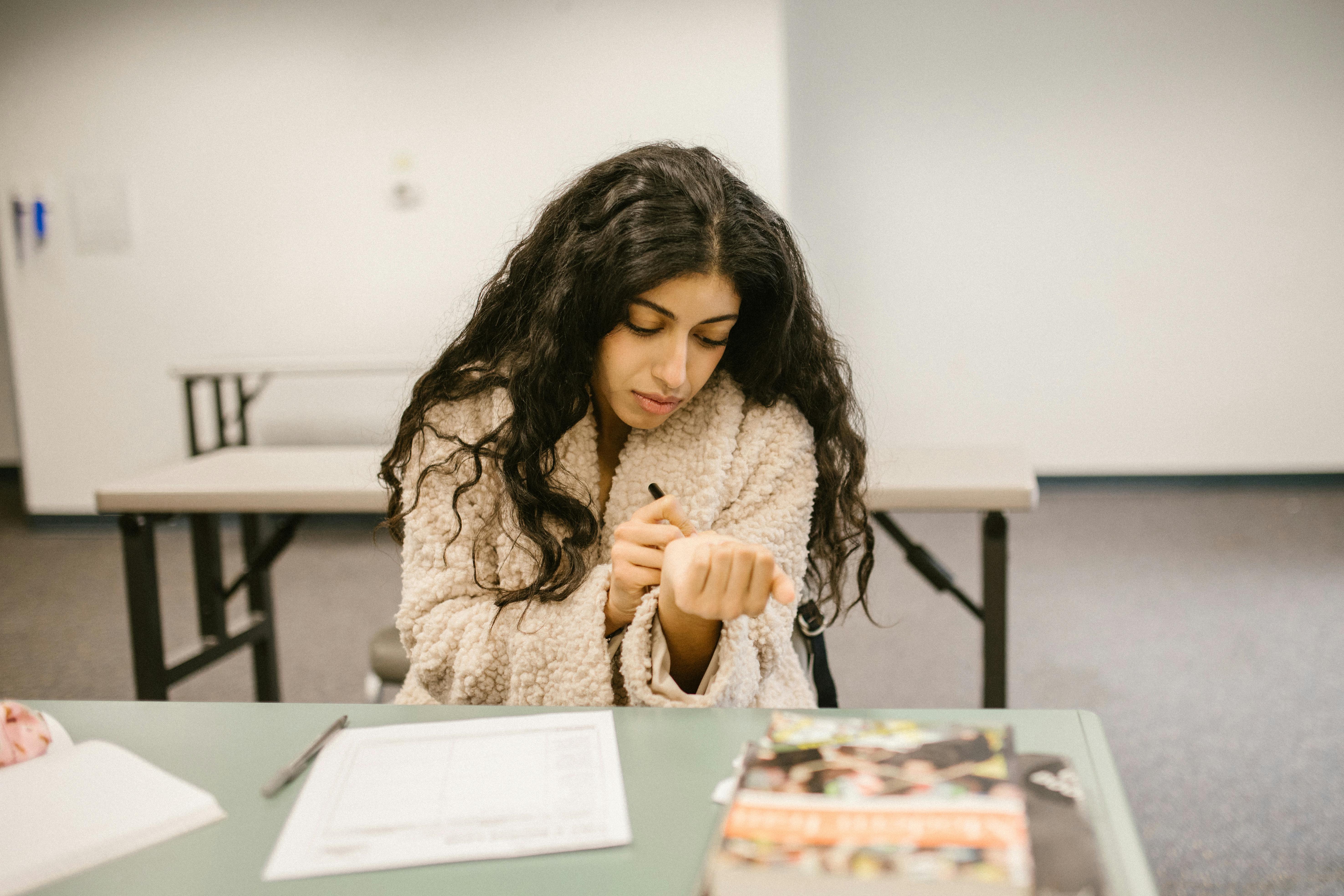 Student Cheating During an Exam · Free Stock Photo