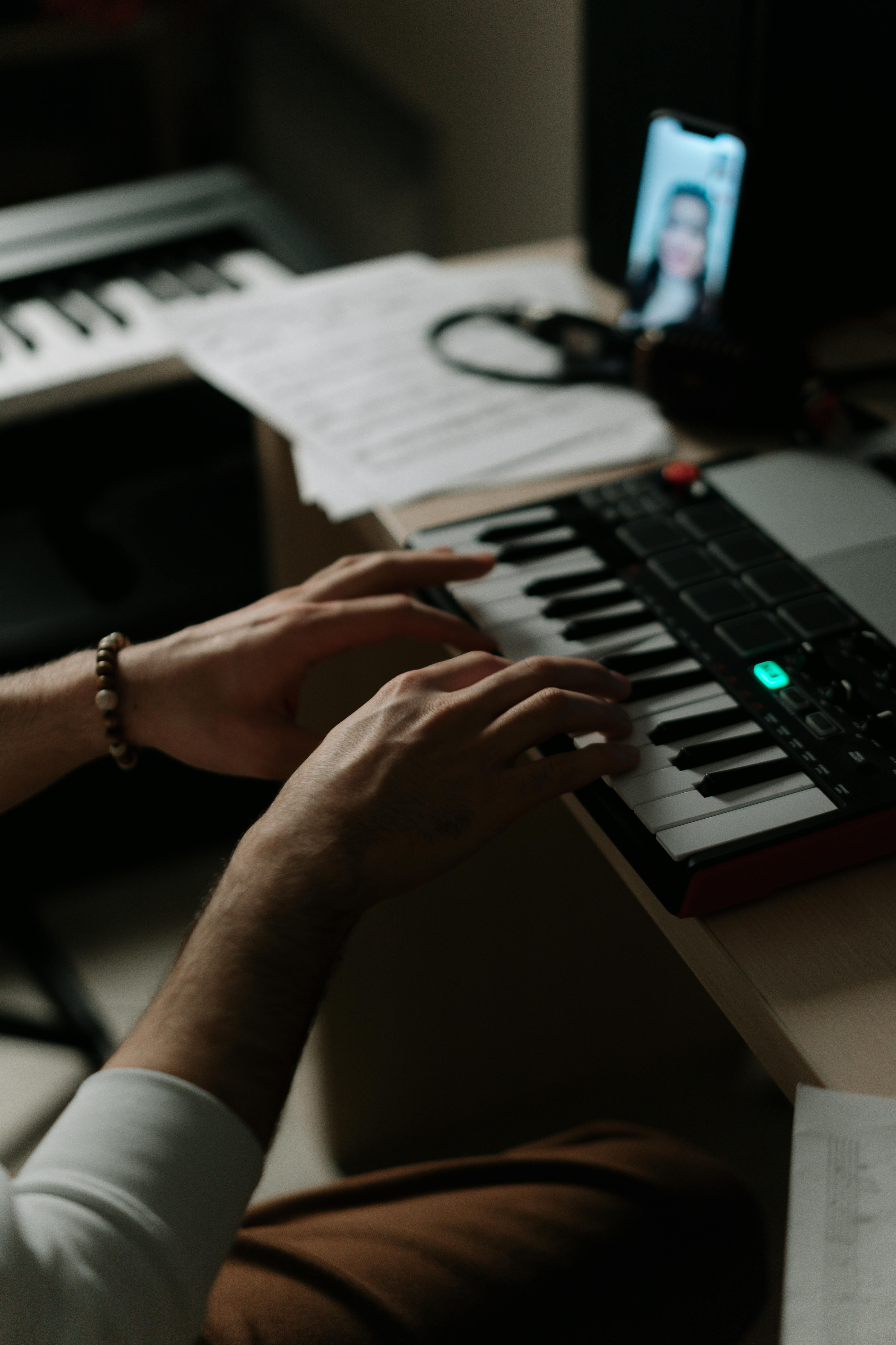 A Person Playing Keyboard Synthesizer · Free Stock Photo