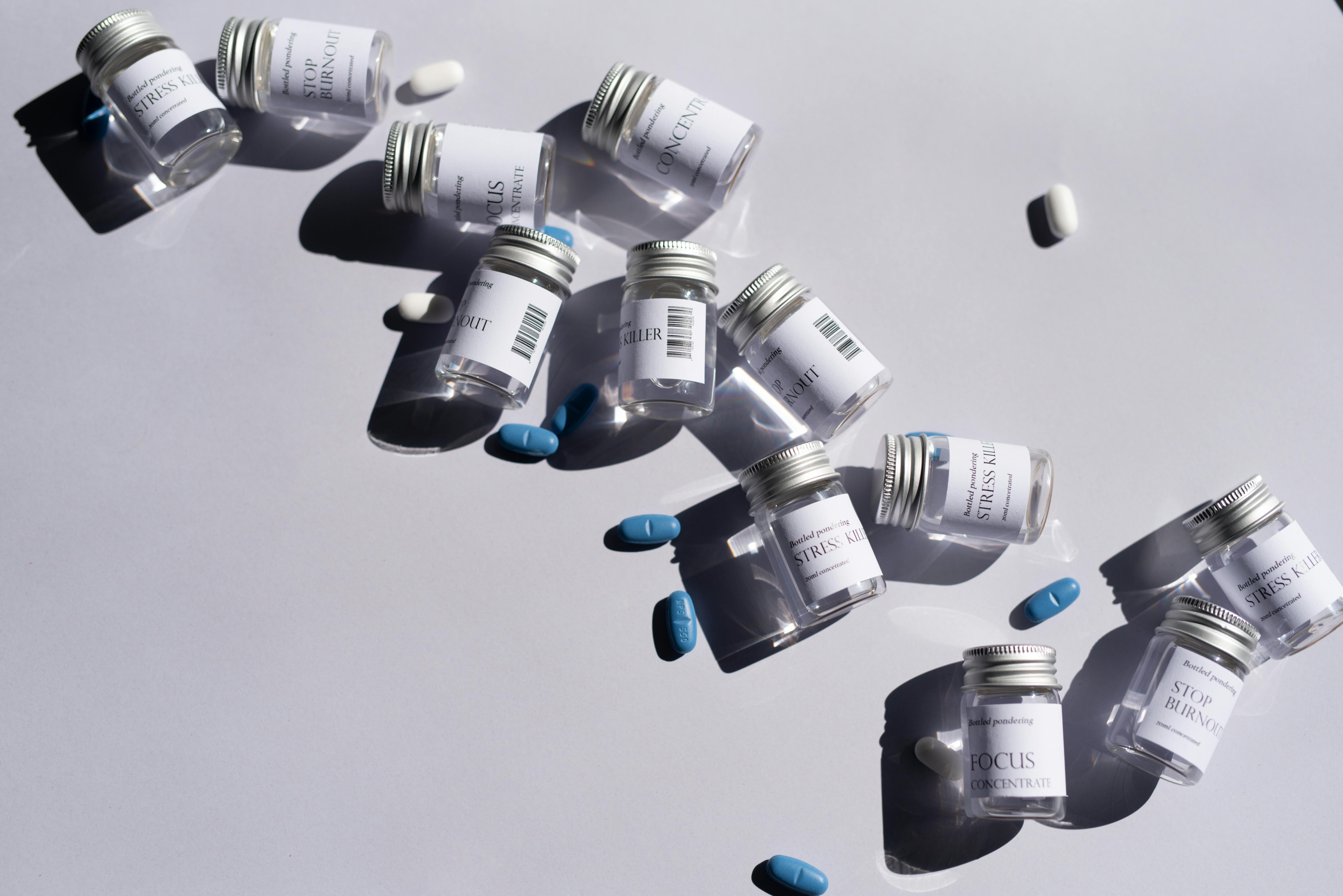Close-Up Shot of a Yellow Stress Ball on a Blue Surface · Free Stock Photo