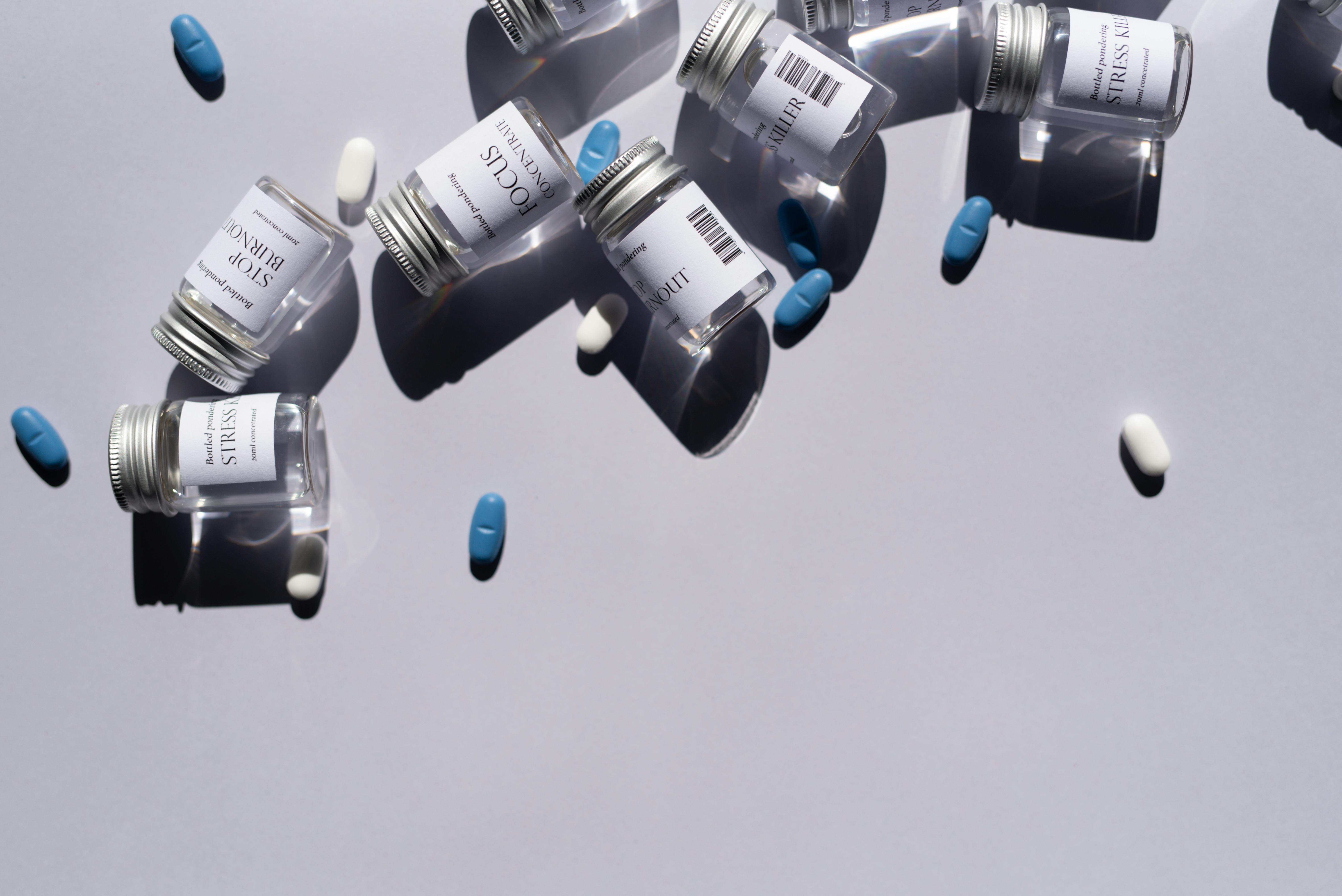 Close-Up Shot of a Yellow Stress Ball on a Blue Surface · Free Stock Photo