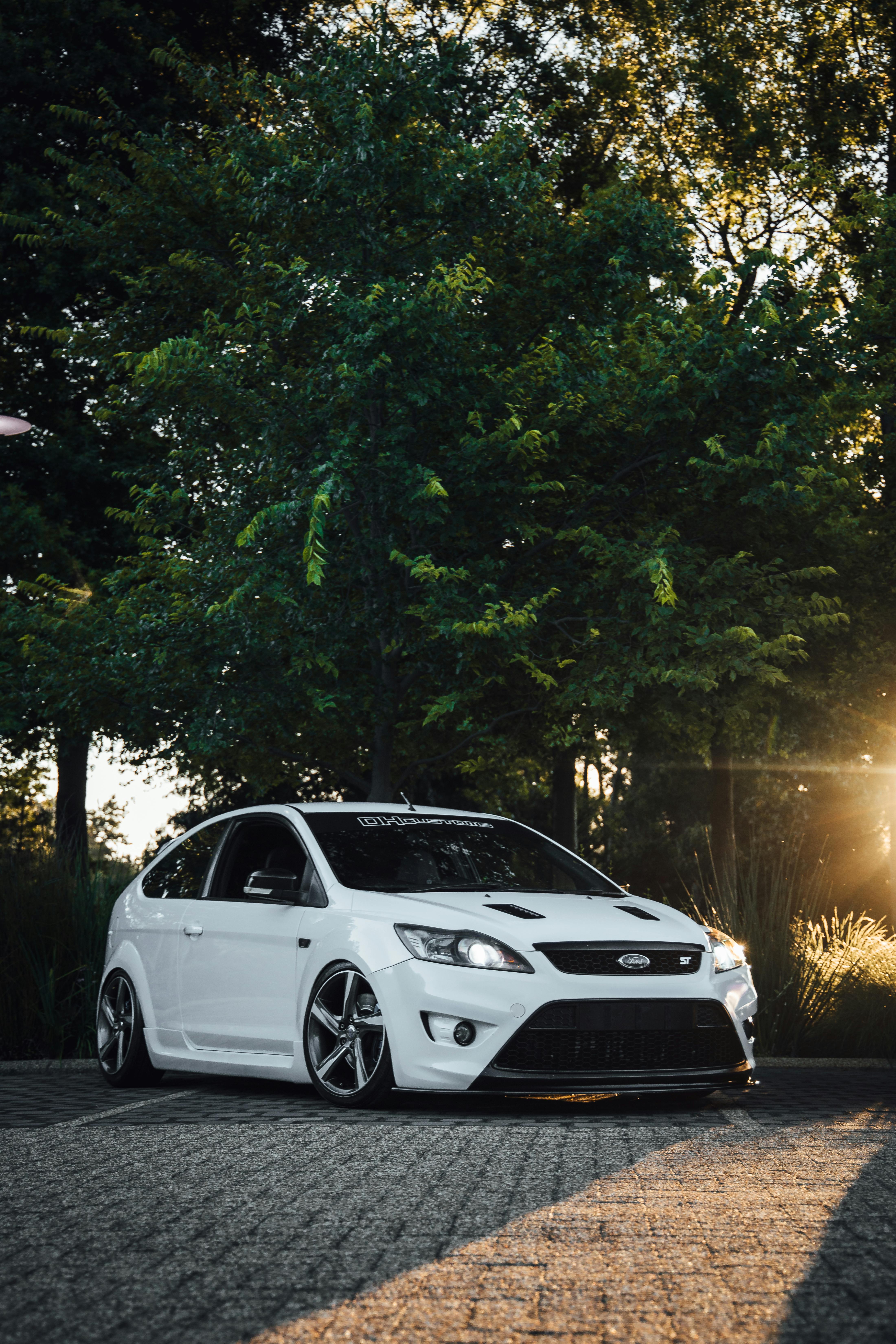 White Car Parked Under a Tree · Free Stock Photo