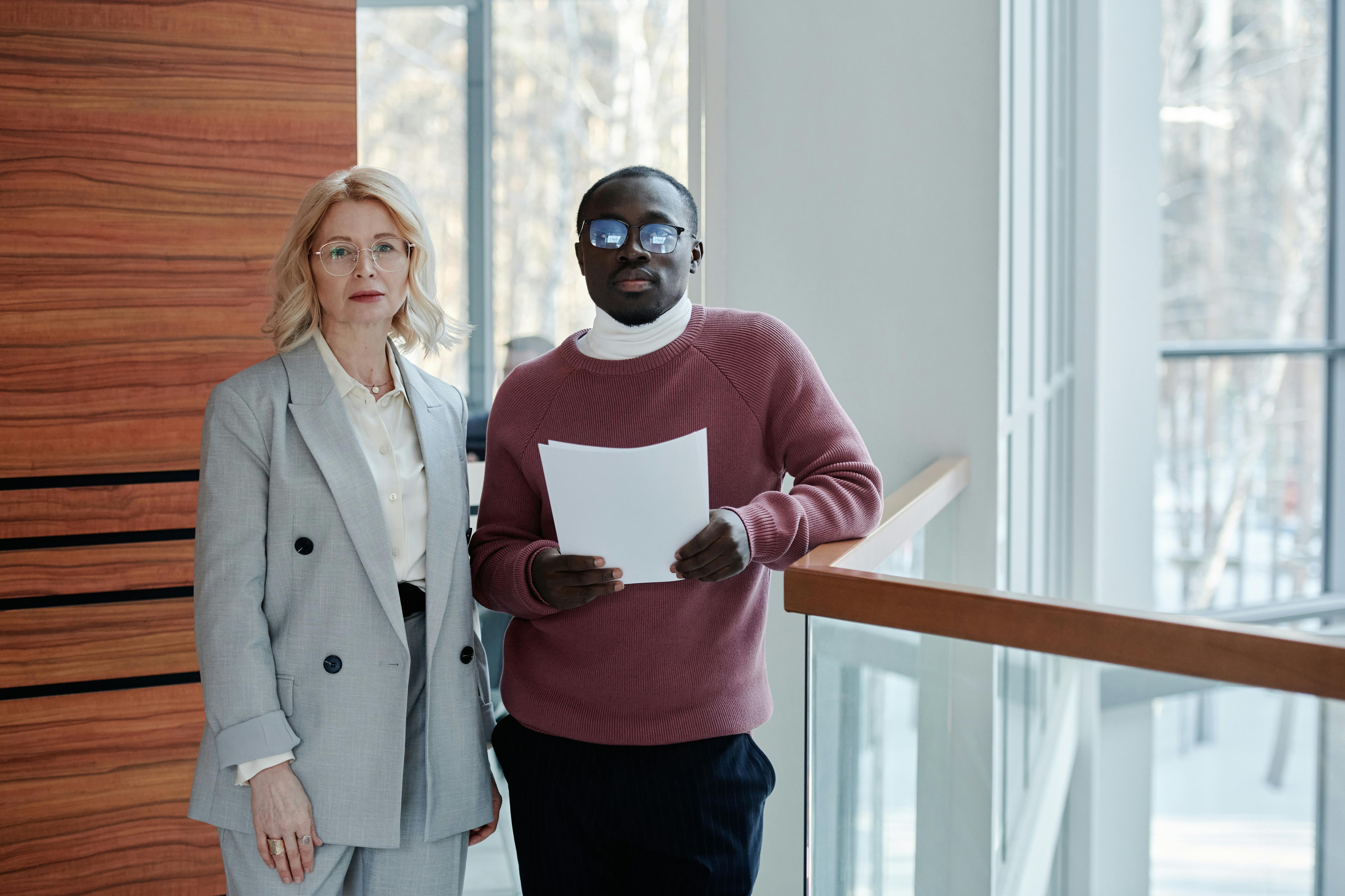 Coworkers Taking a Coffee Break and Walking · Free Stock Photo