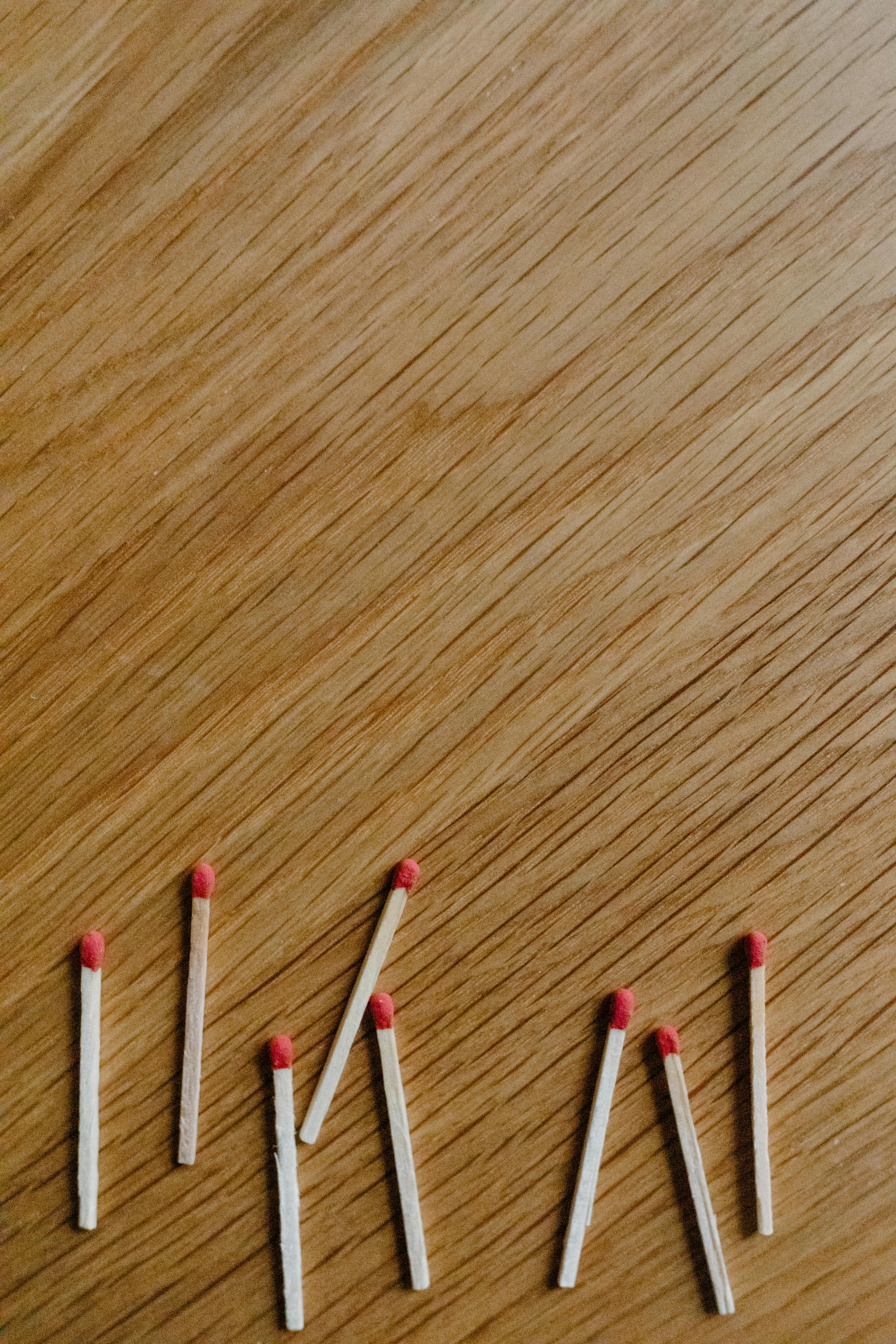 Matchsticks on Wooden Surface · Free Stock Photo