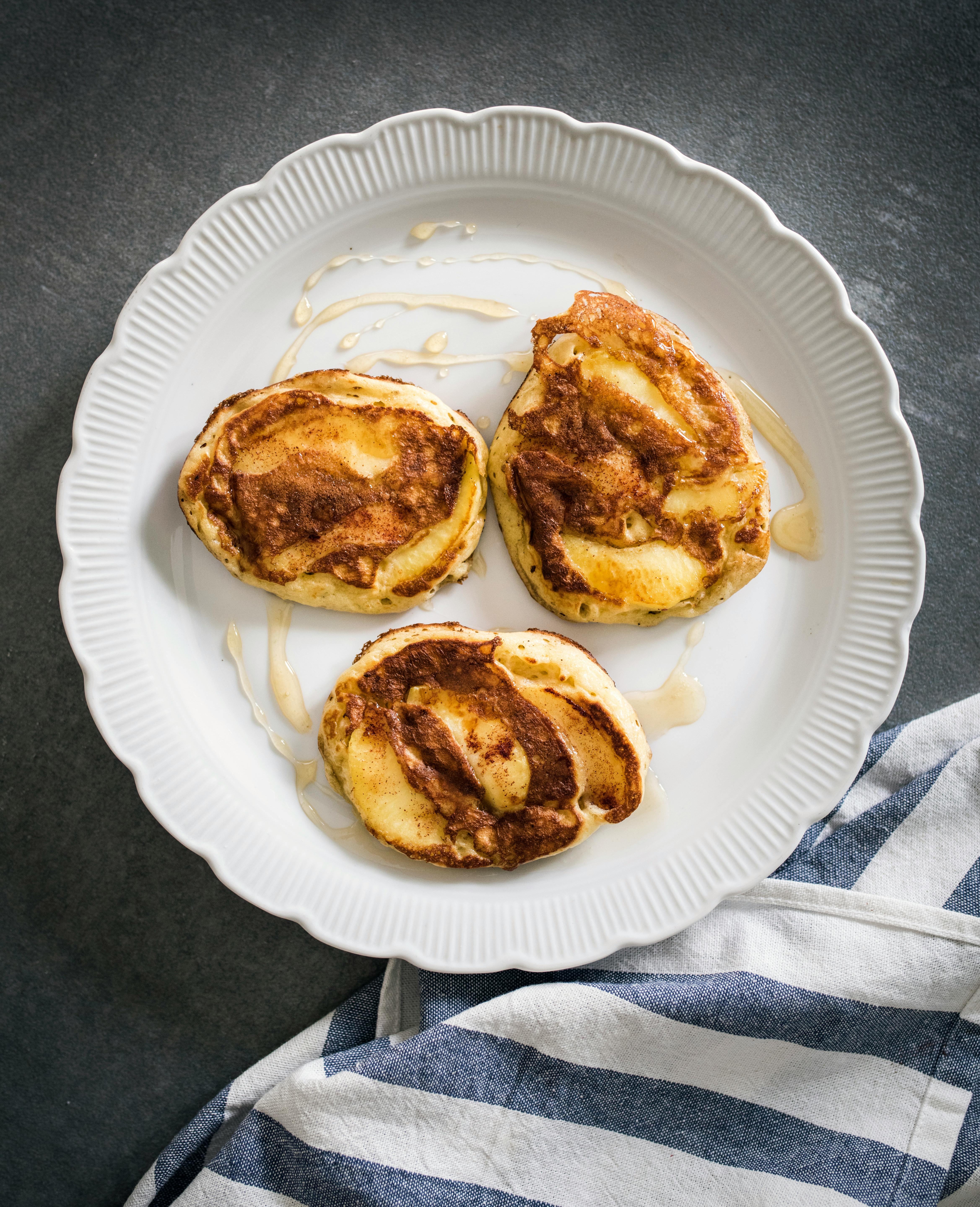 Toast Decorated with Pink Flowers on a Ceramic Plate · Free Stock Photo