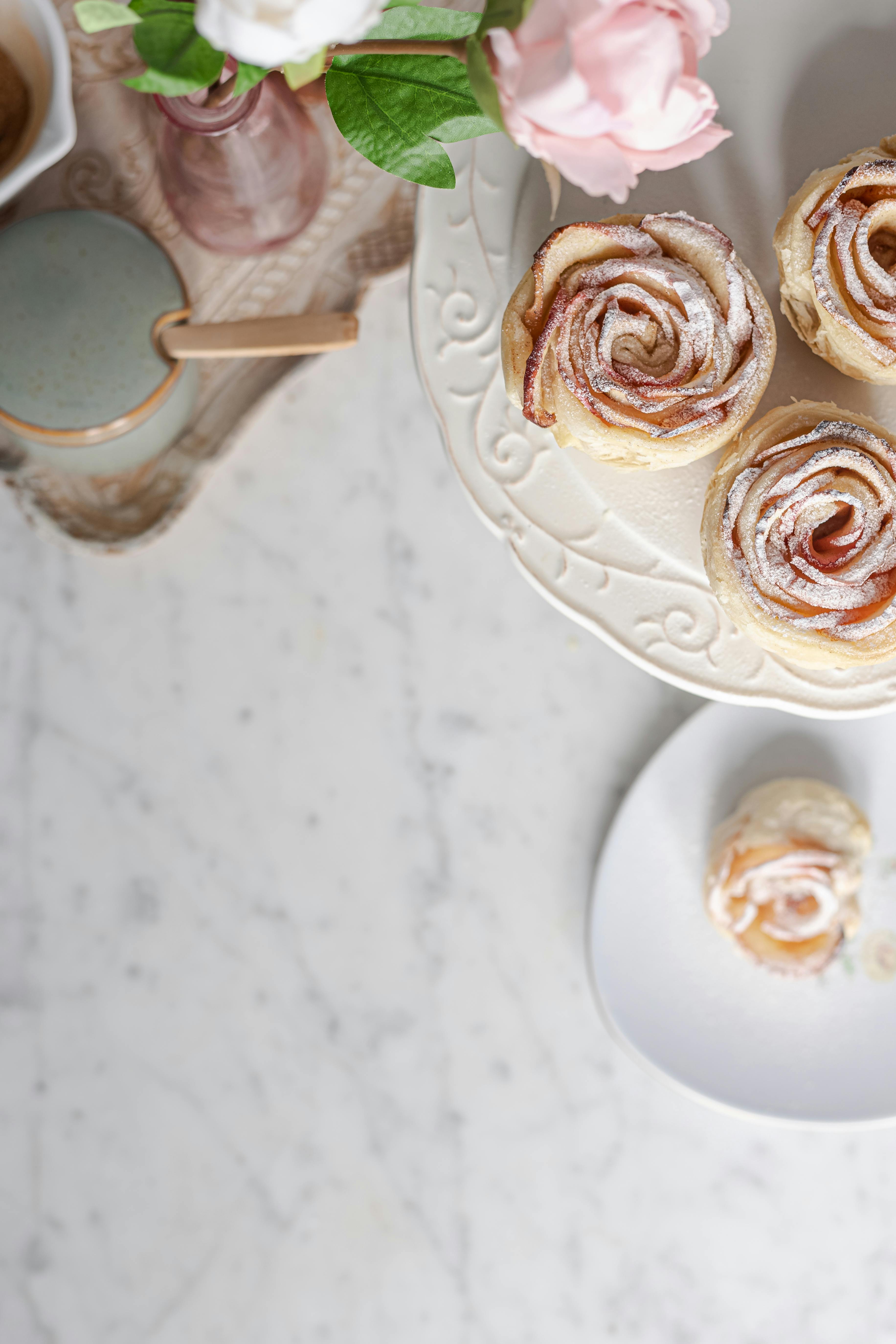 Delicious Apple Rose Puffs on White Cake Stand · Free Stock Photo